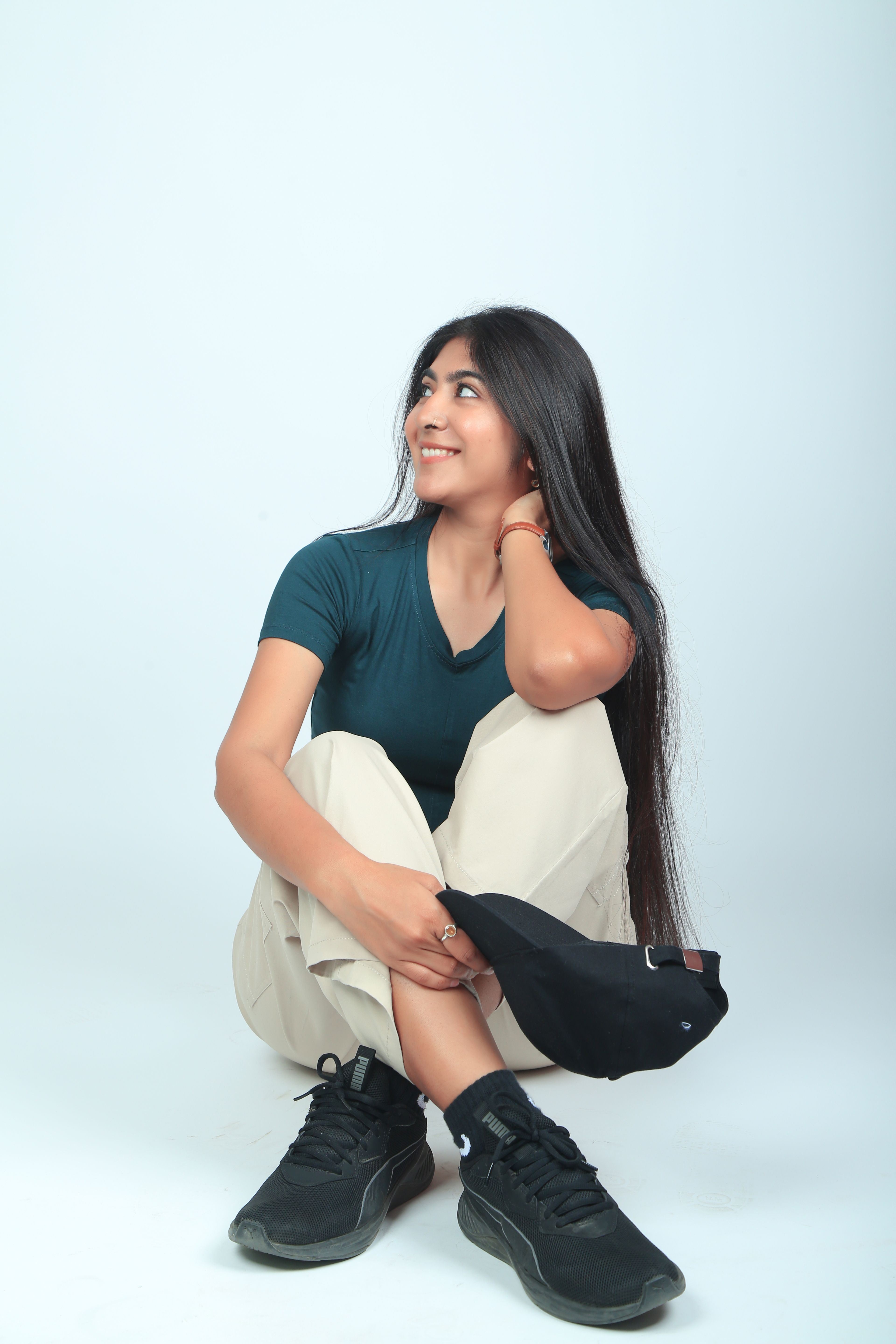 Smiling Brunette Woman Sitting · Free Stock Photo