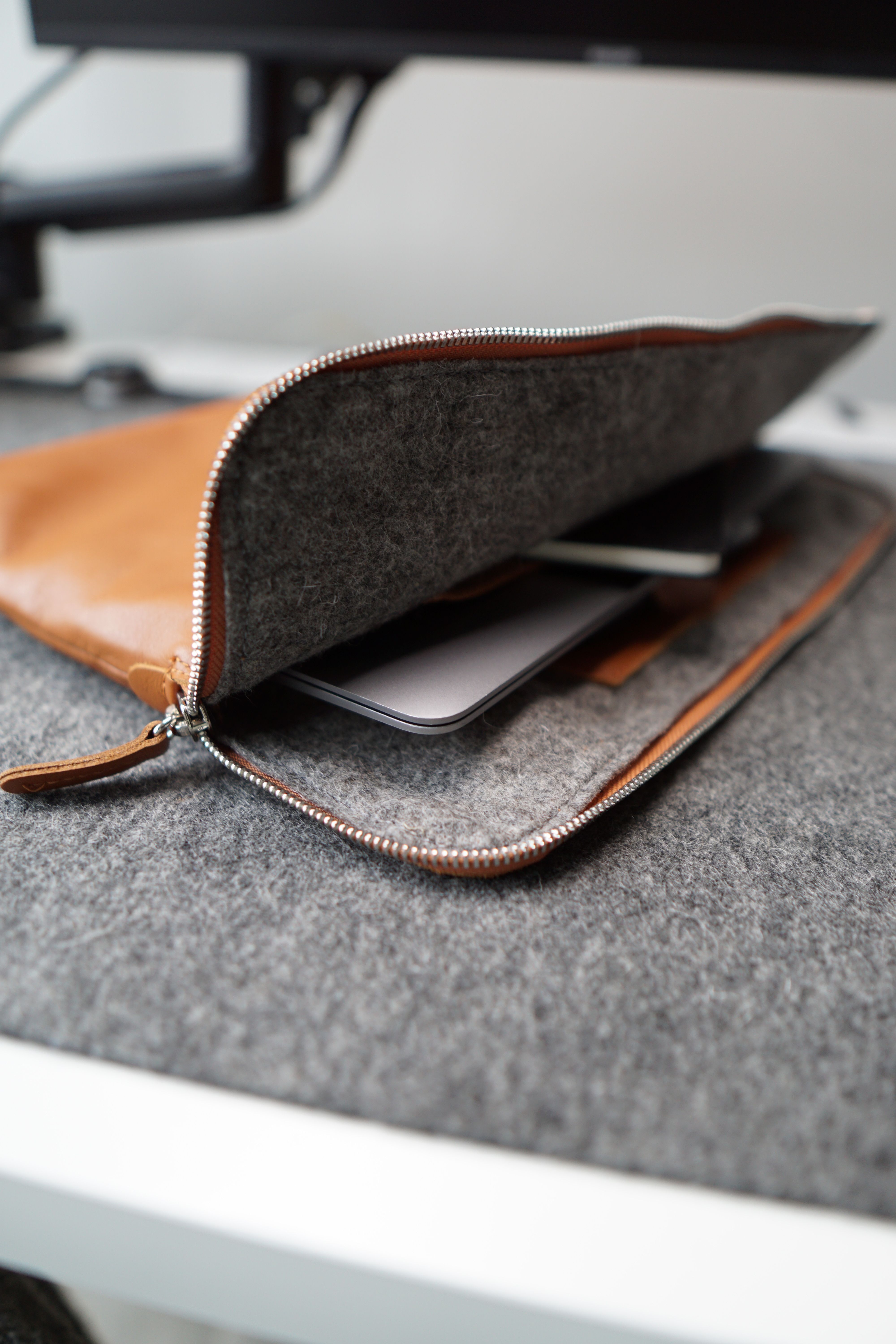 Brown Leather Laptop Bag on Desk with Grey Pad · Free Stock Photo