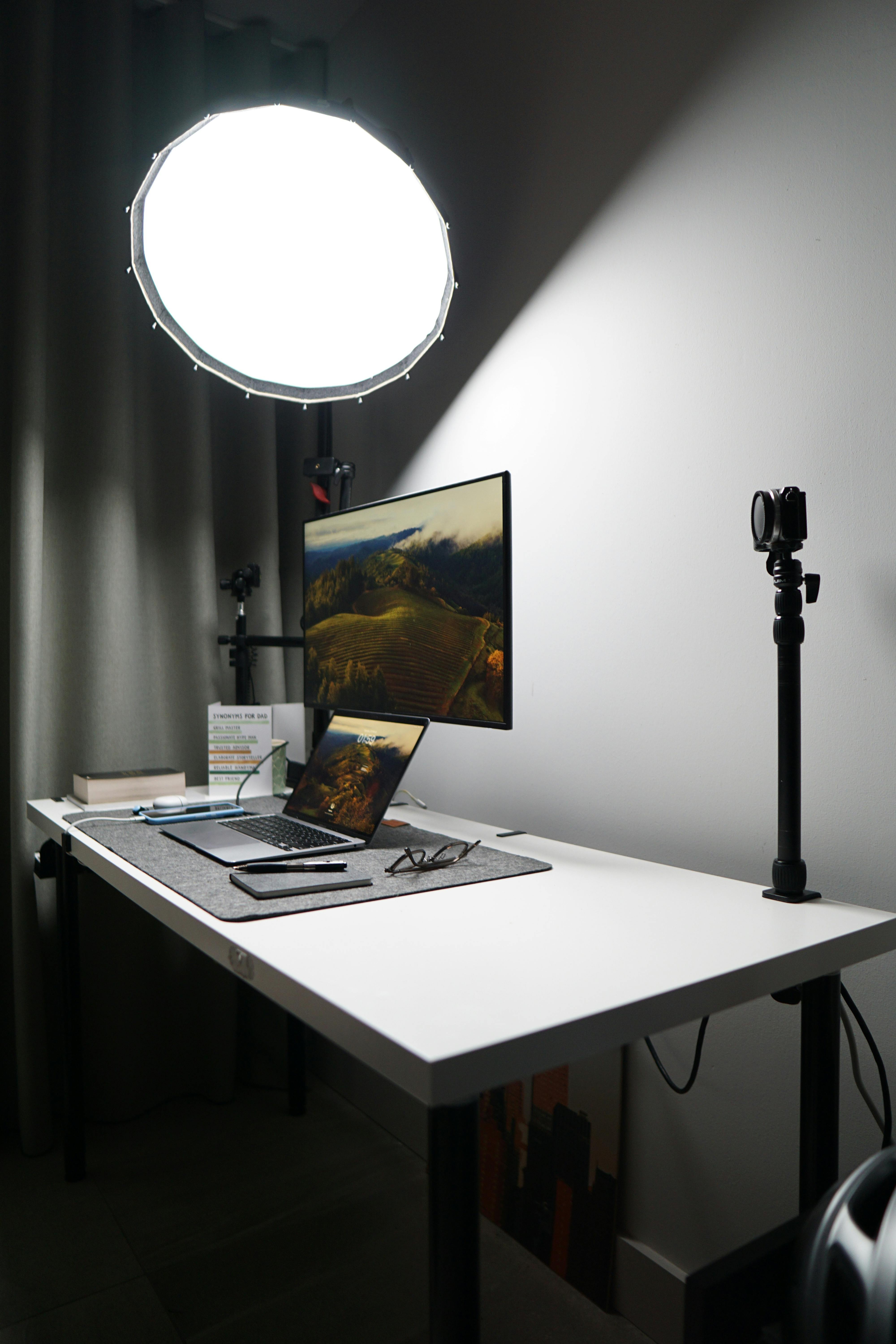 Streamers Desk with Studio Lamp Laptop and a Camera on Mount · Free ...
