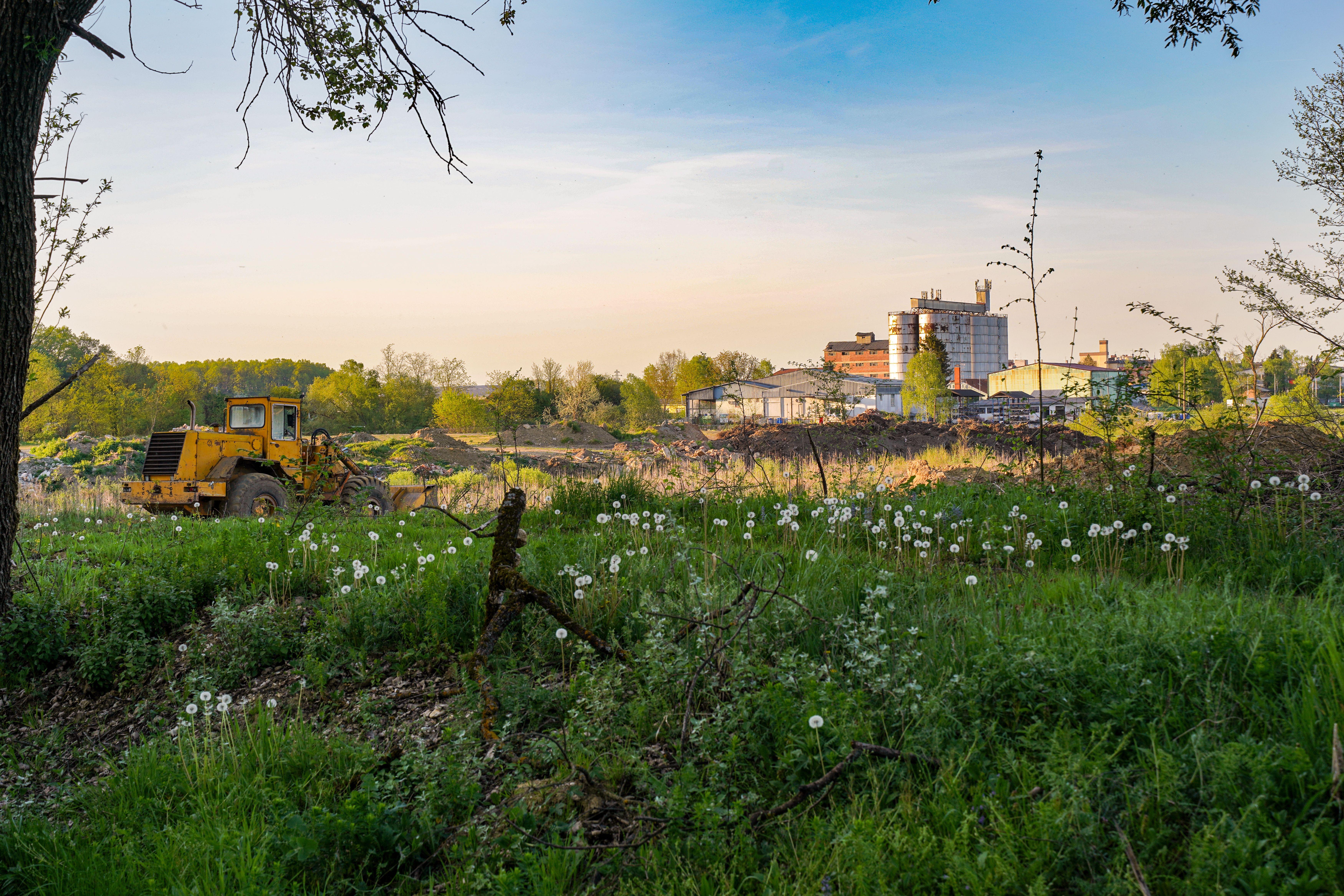 Bulldozer on Meadow in Countryside · Free Stock Photo