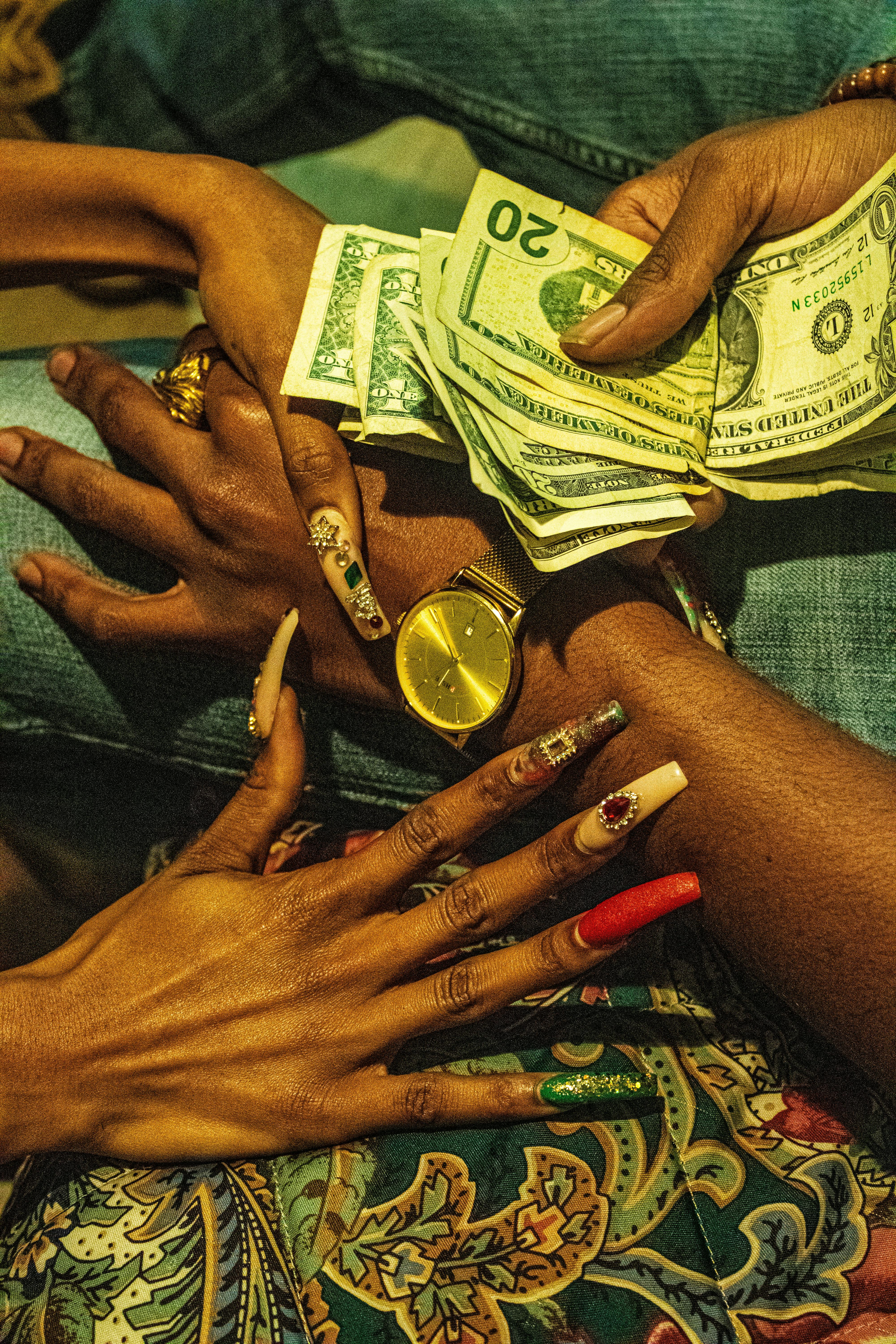 Female Hands Caressing Male Hands Holding Money · Free Stock Photo