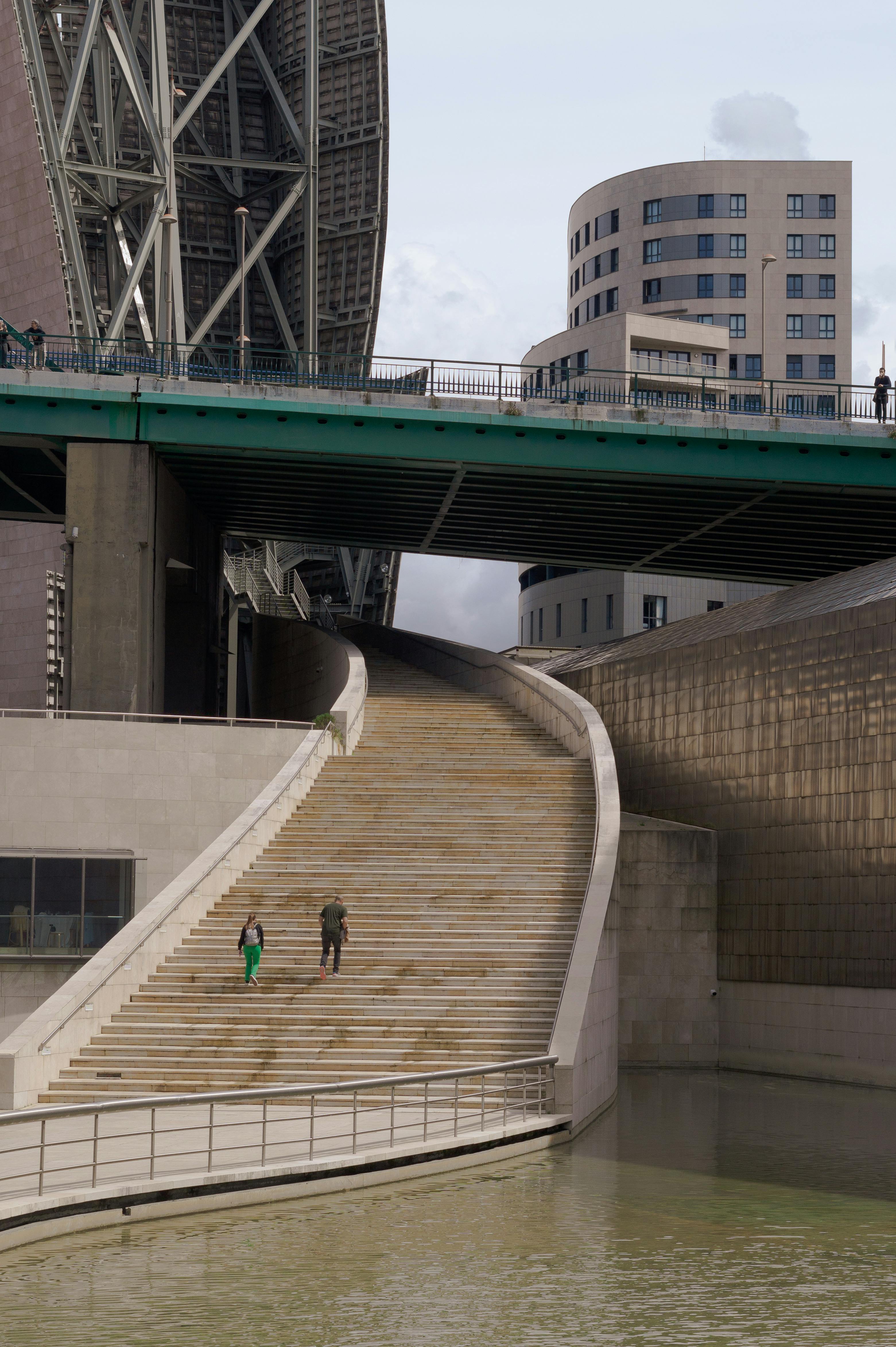 People on Waterfront Steps · Free Stock Photo