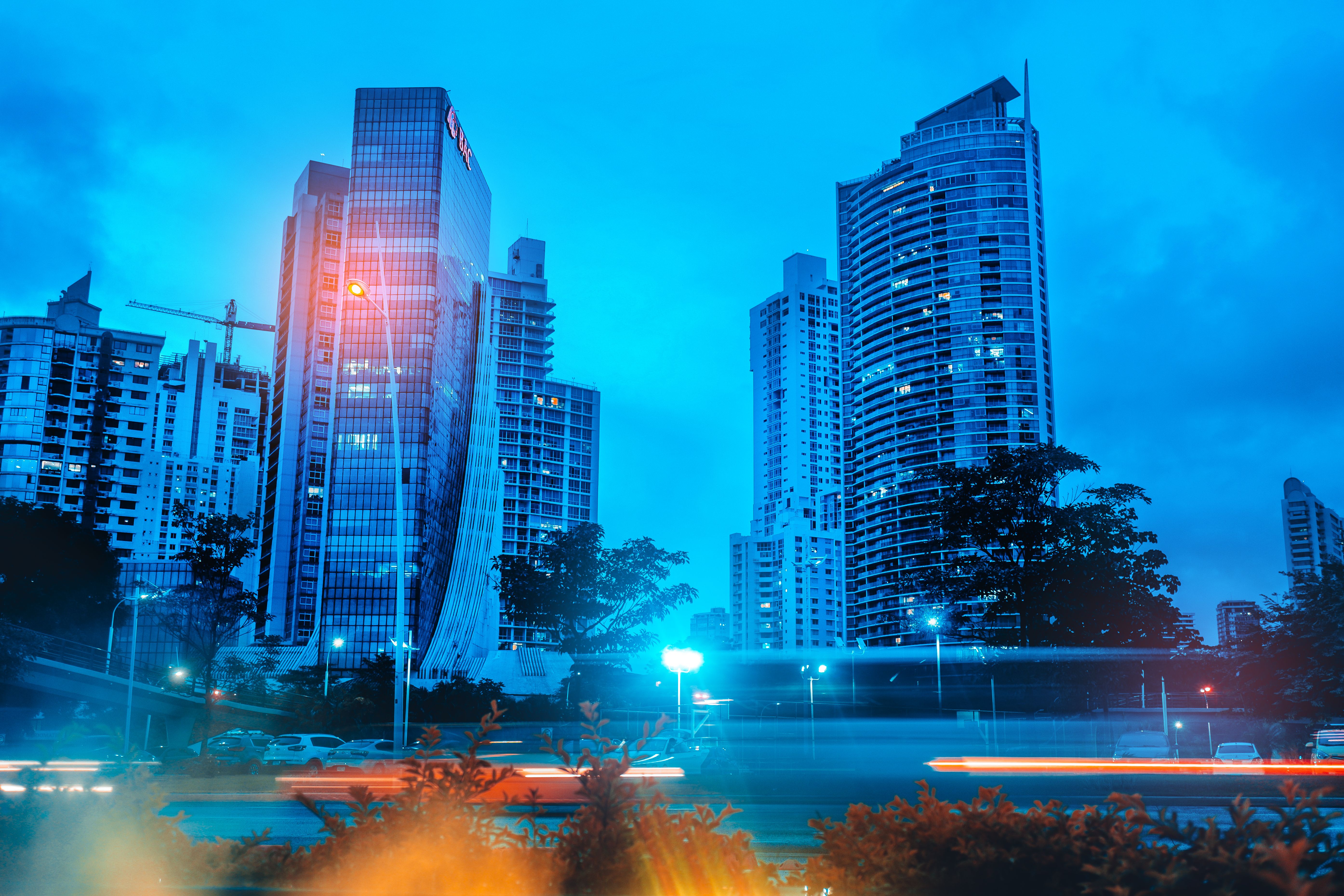 Photo Of Buildings Under Cloudy Skies · Free Stock Photo