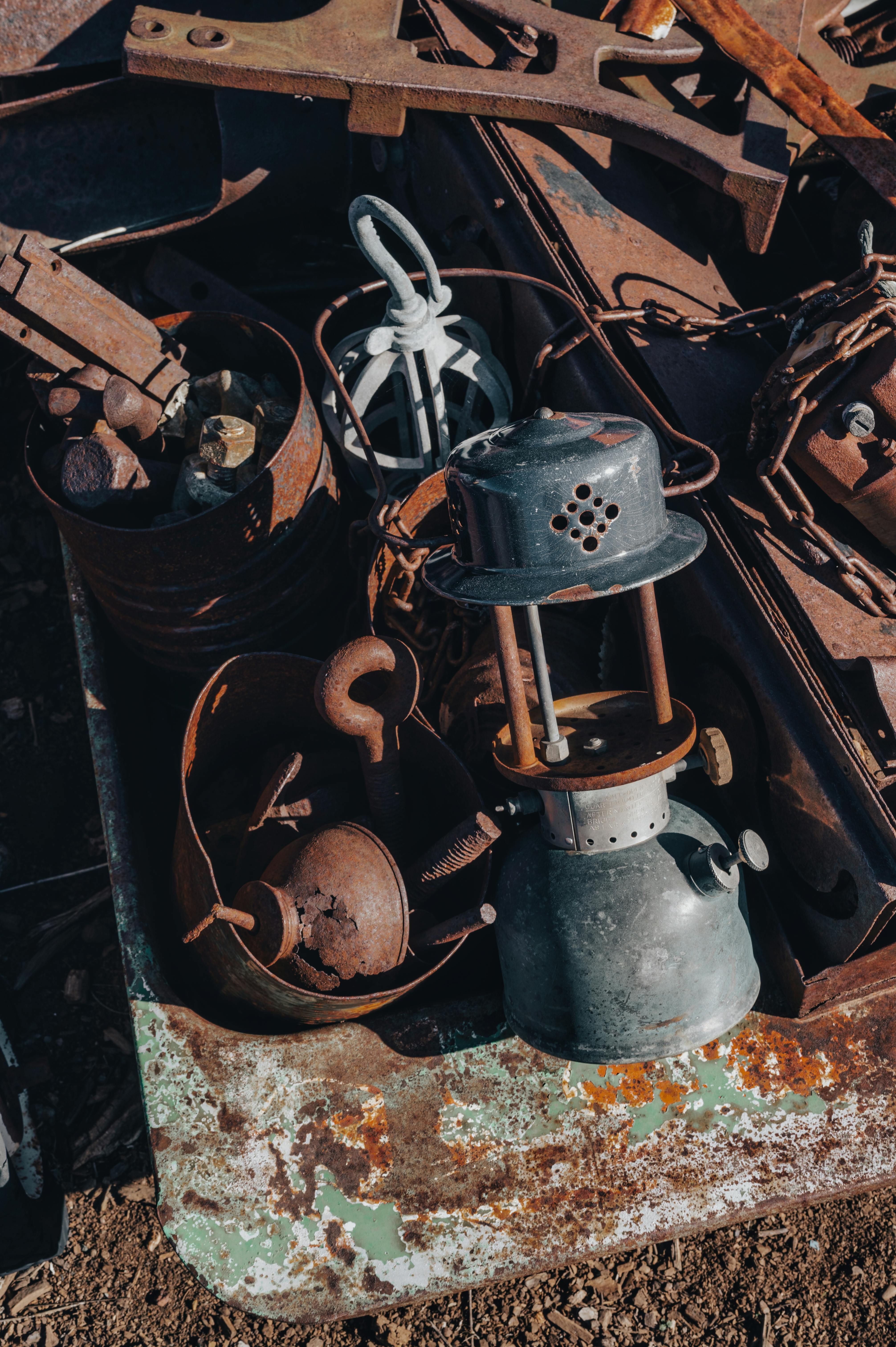 A pile of rusty objects on a table · Free Stock Photo