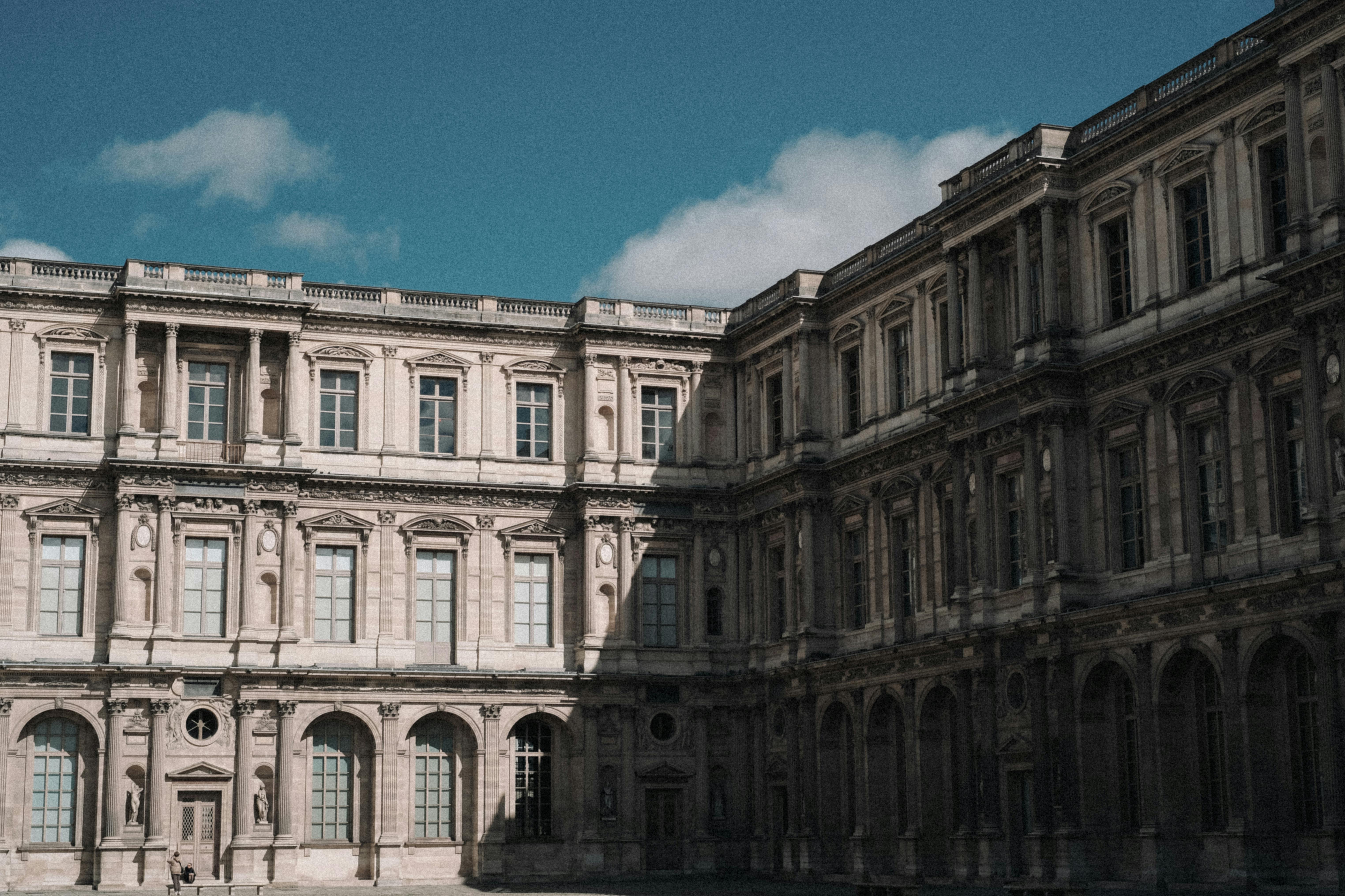 Wall of Louvre Museum in Paris · Free Stock Photo
