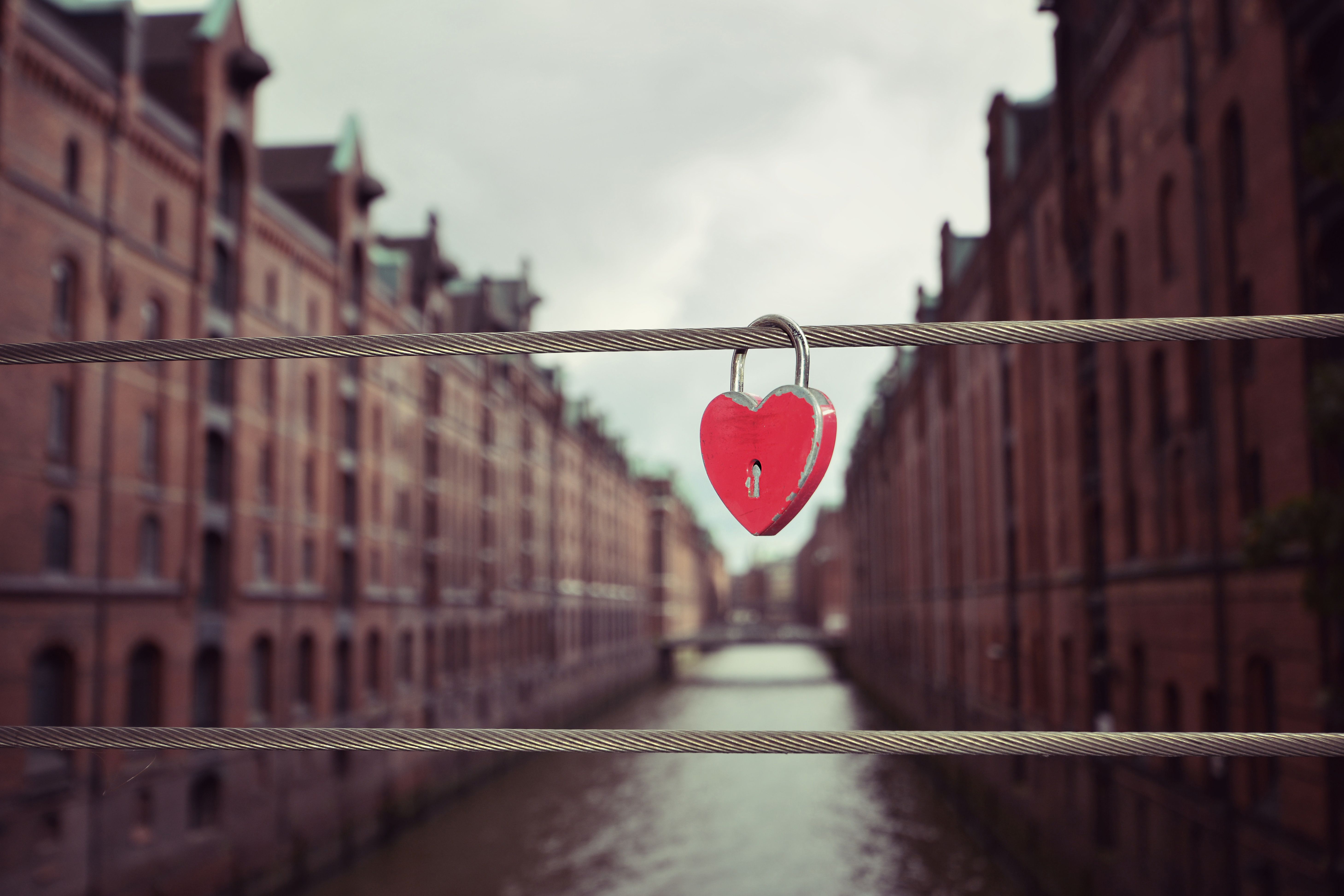 Heart-Shaped Key Ring in Front of a Canal · Free Stock Photo