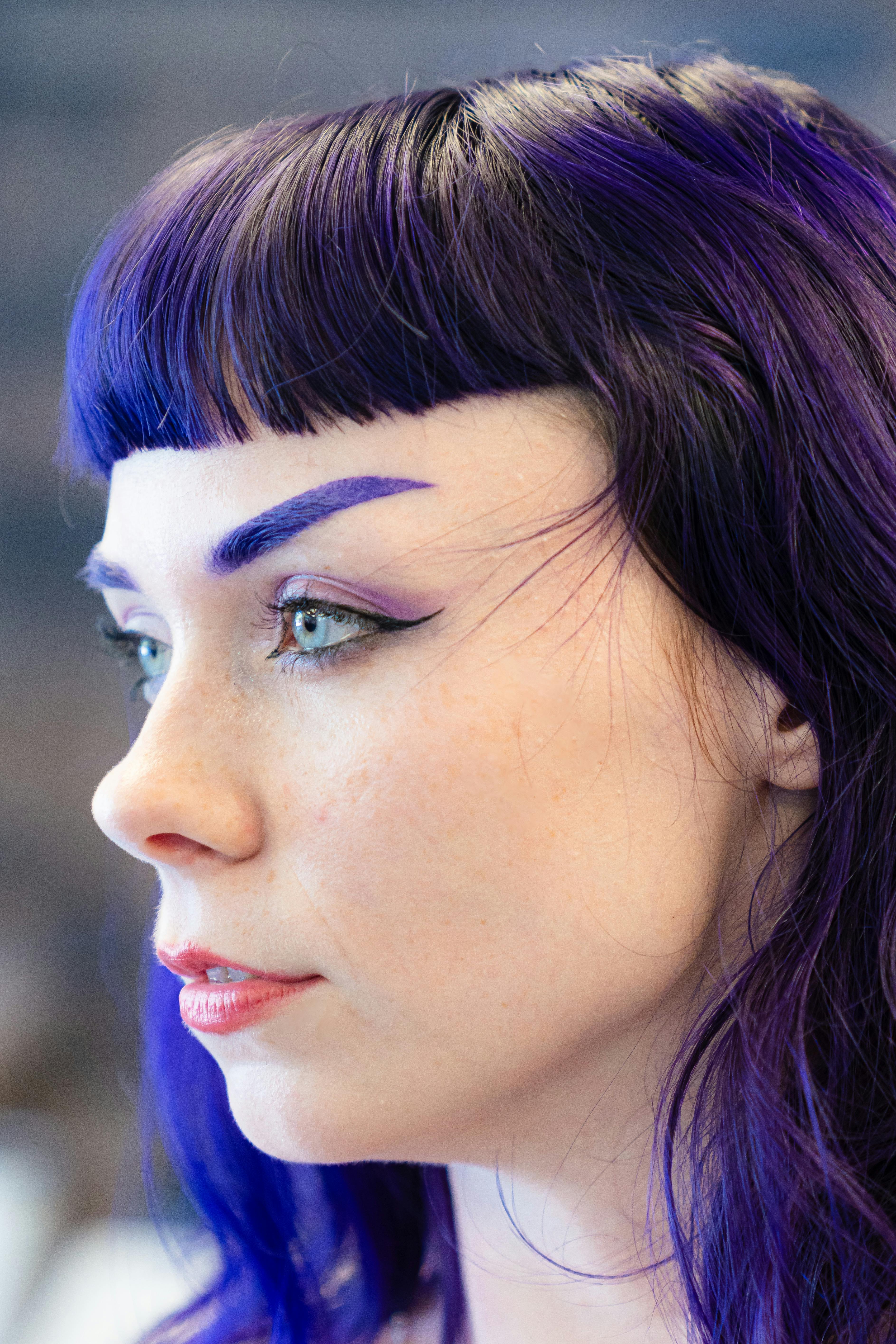 Profile of a Beautiful Young Woman with Purple Eye and Makeup · Free ...