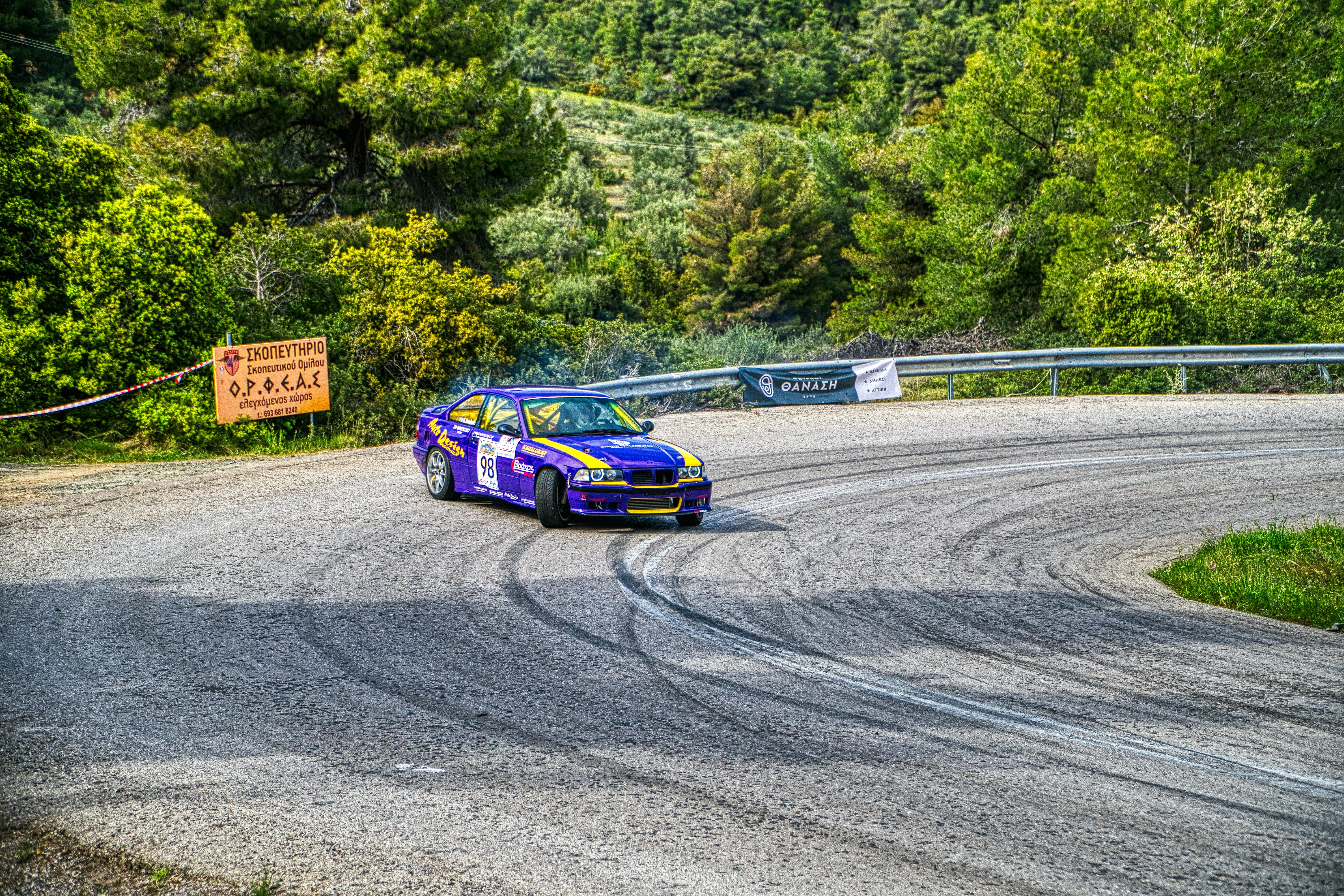 Sports Car Drifting on a Road · Free Stock Photo