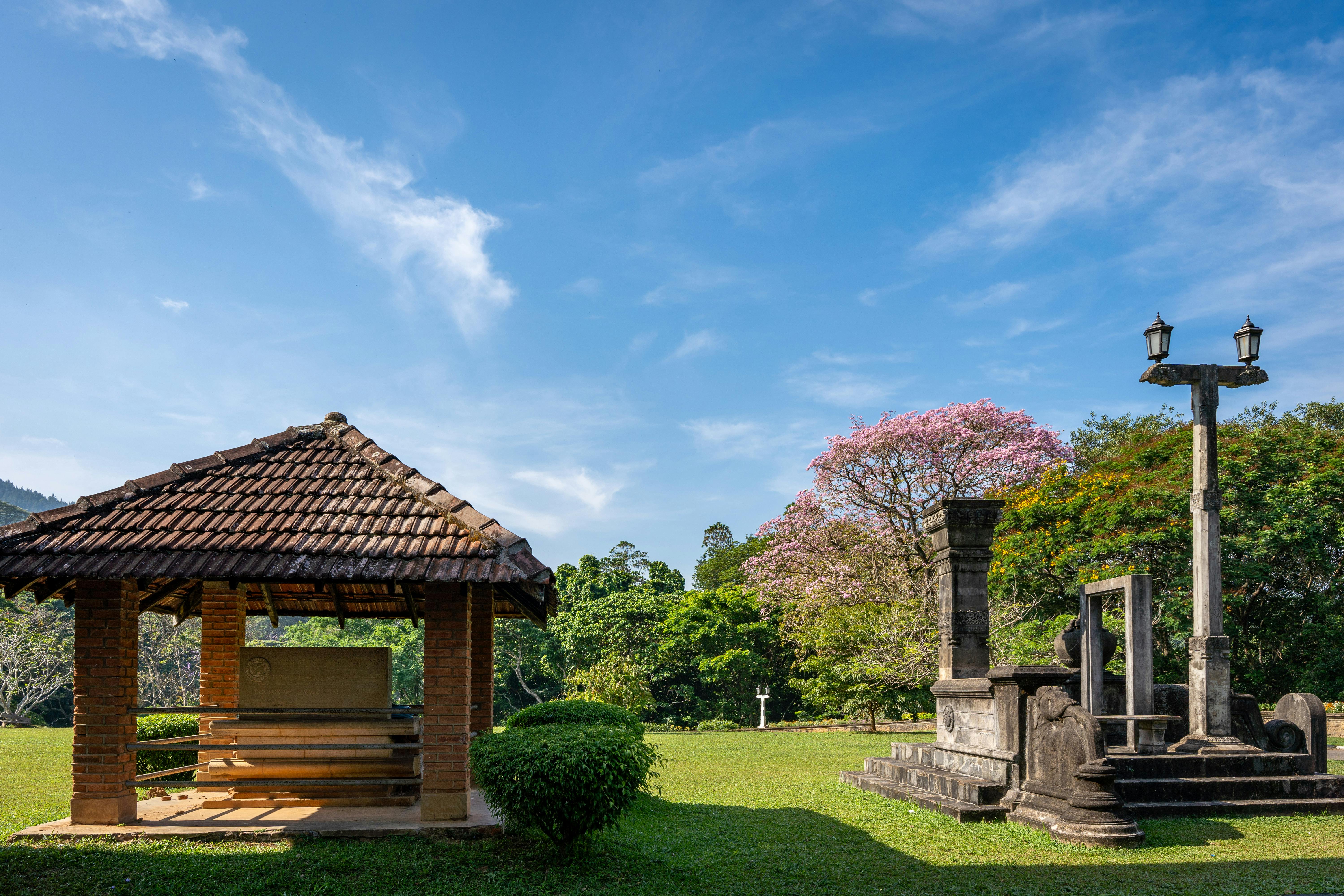 Big Garden with Pavilion and a Monument in the Sunlight · Free Stock Photo