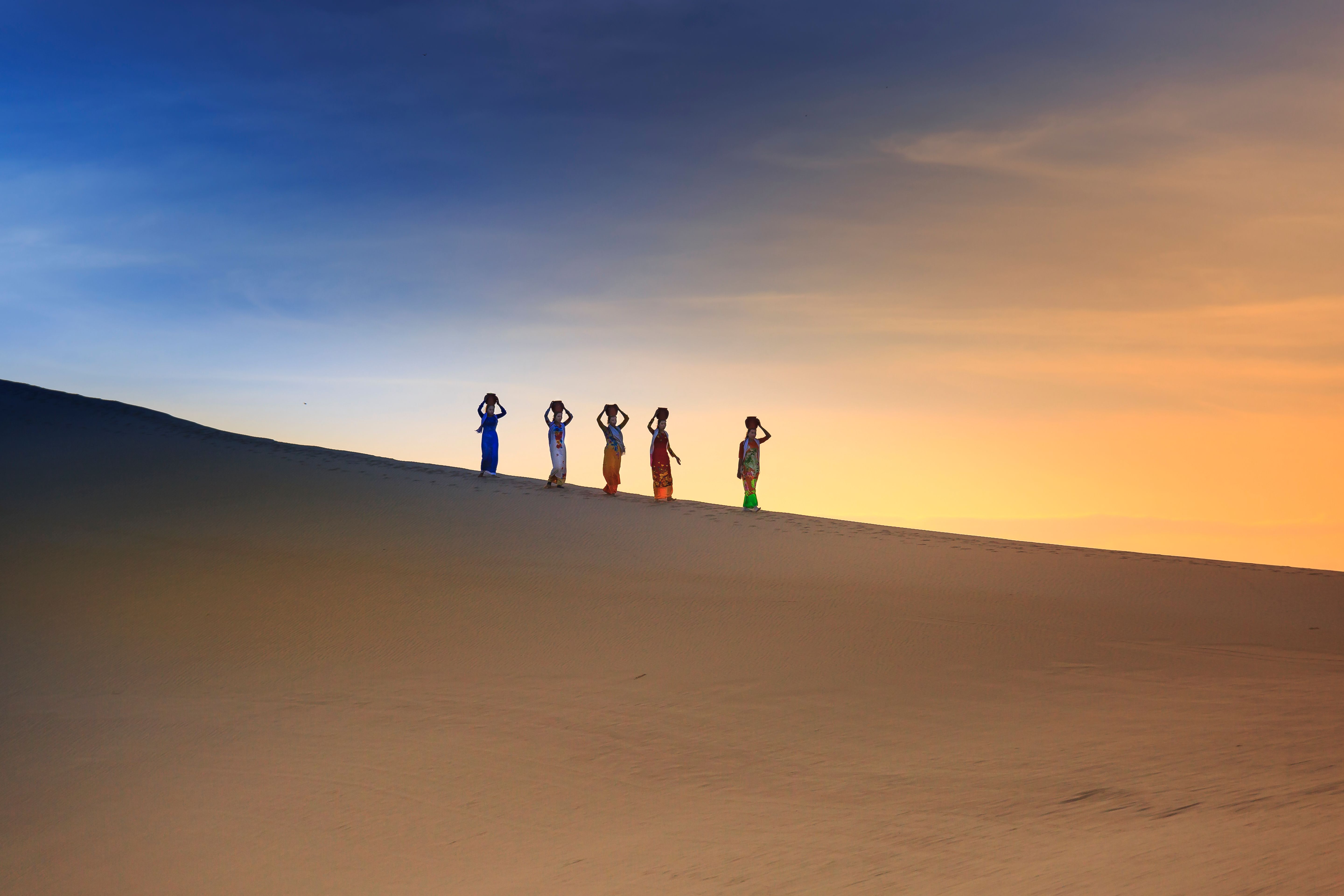 Five People on Desert · Free Stock Photo