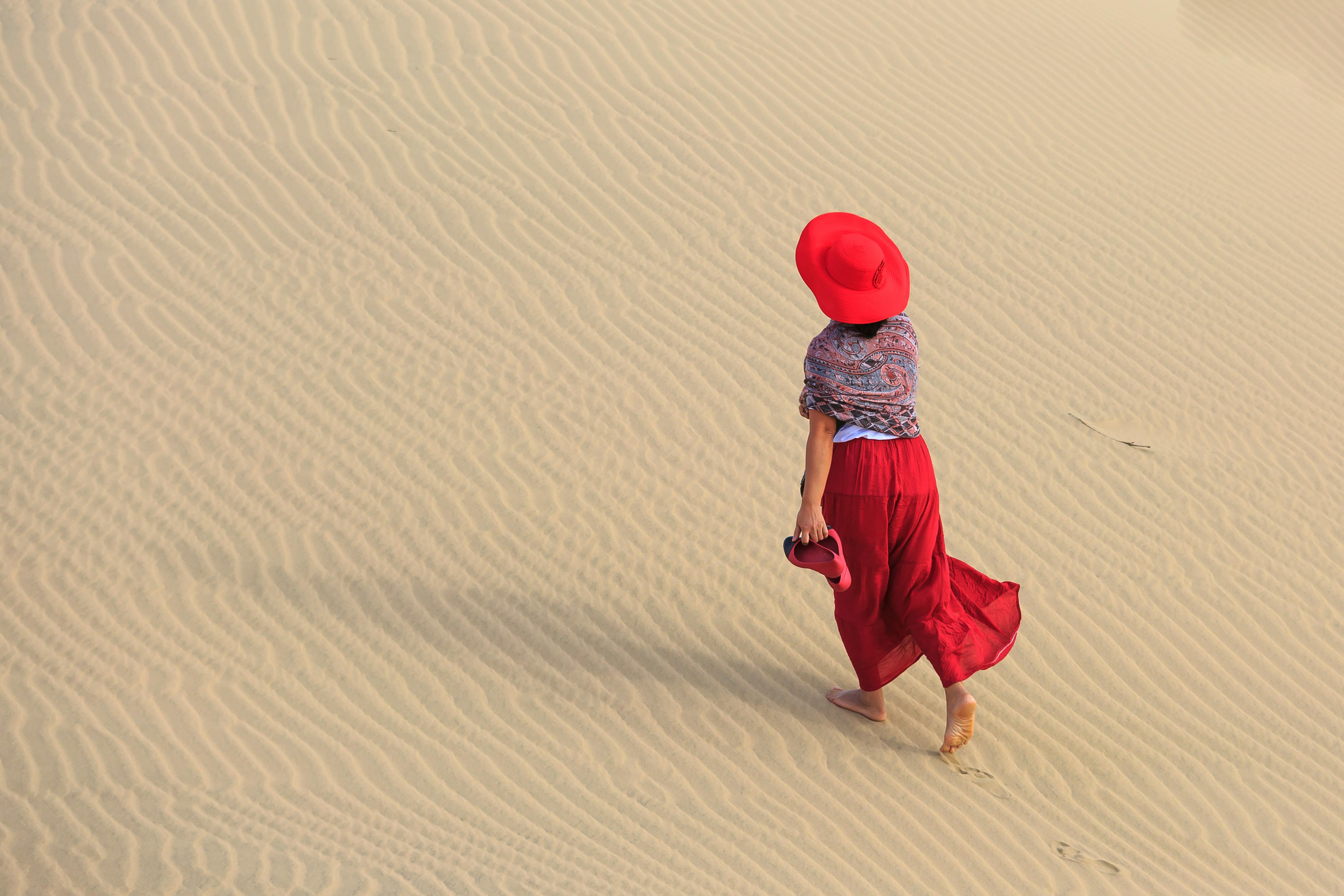Woman Walking on Sands · Free Stock Photo