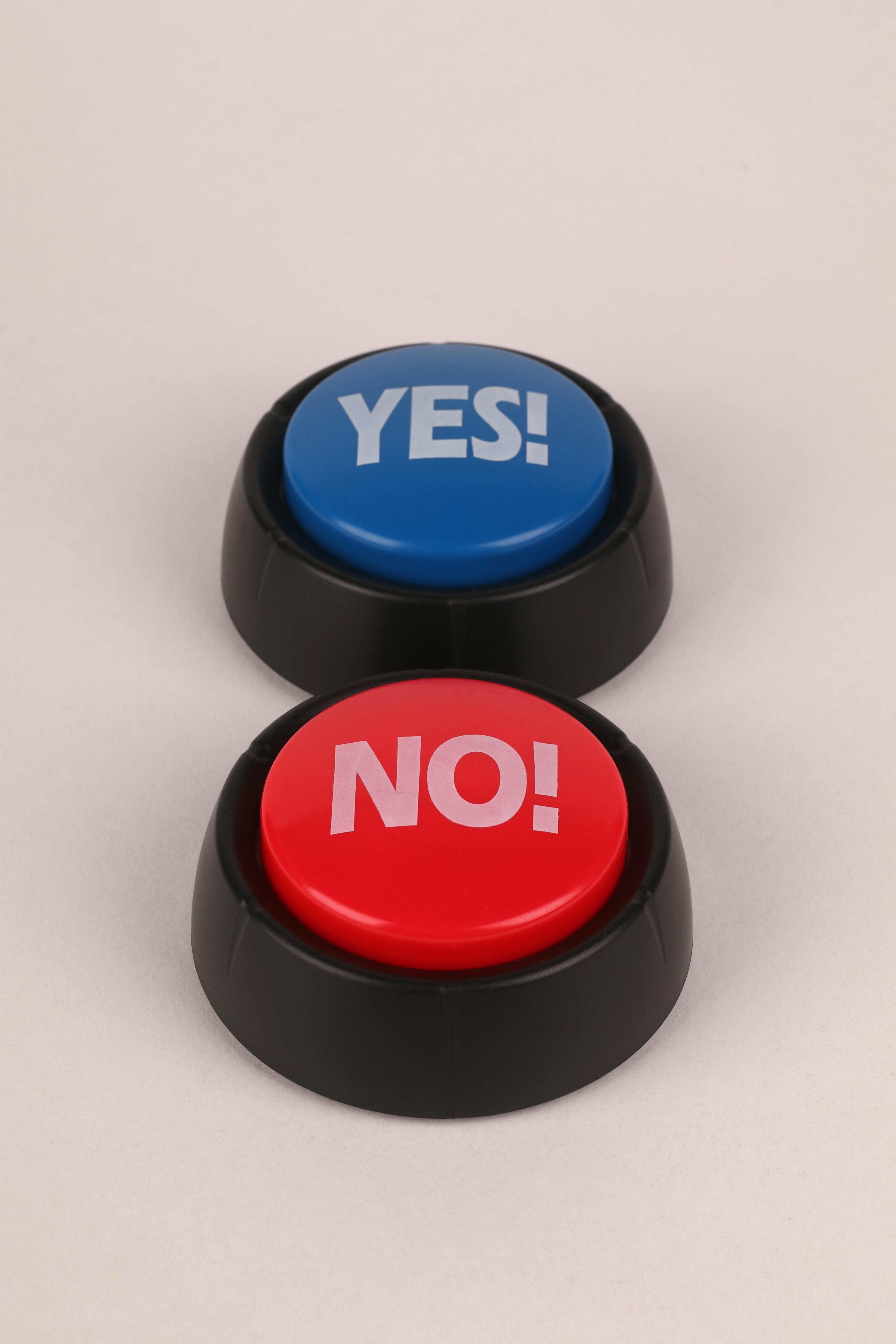 A Blue "Yes" Button and a Red "No" Button · Free Stock Photo
