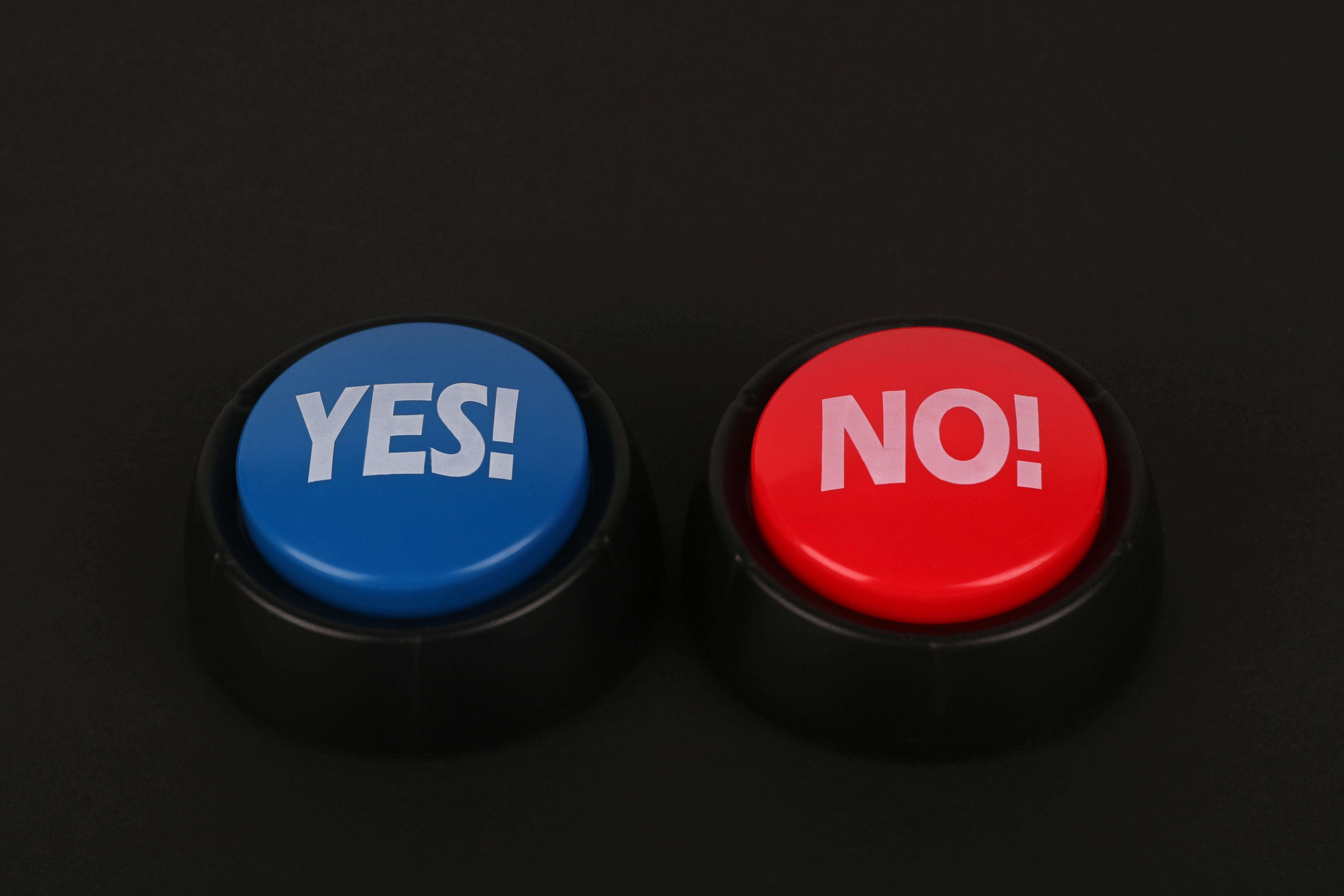 Two buttons with the word yes and no · Free Stock Photo