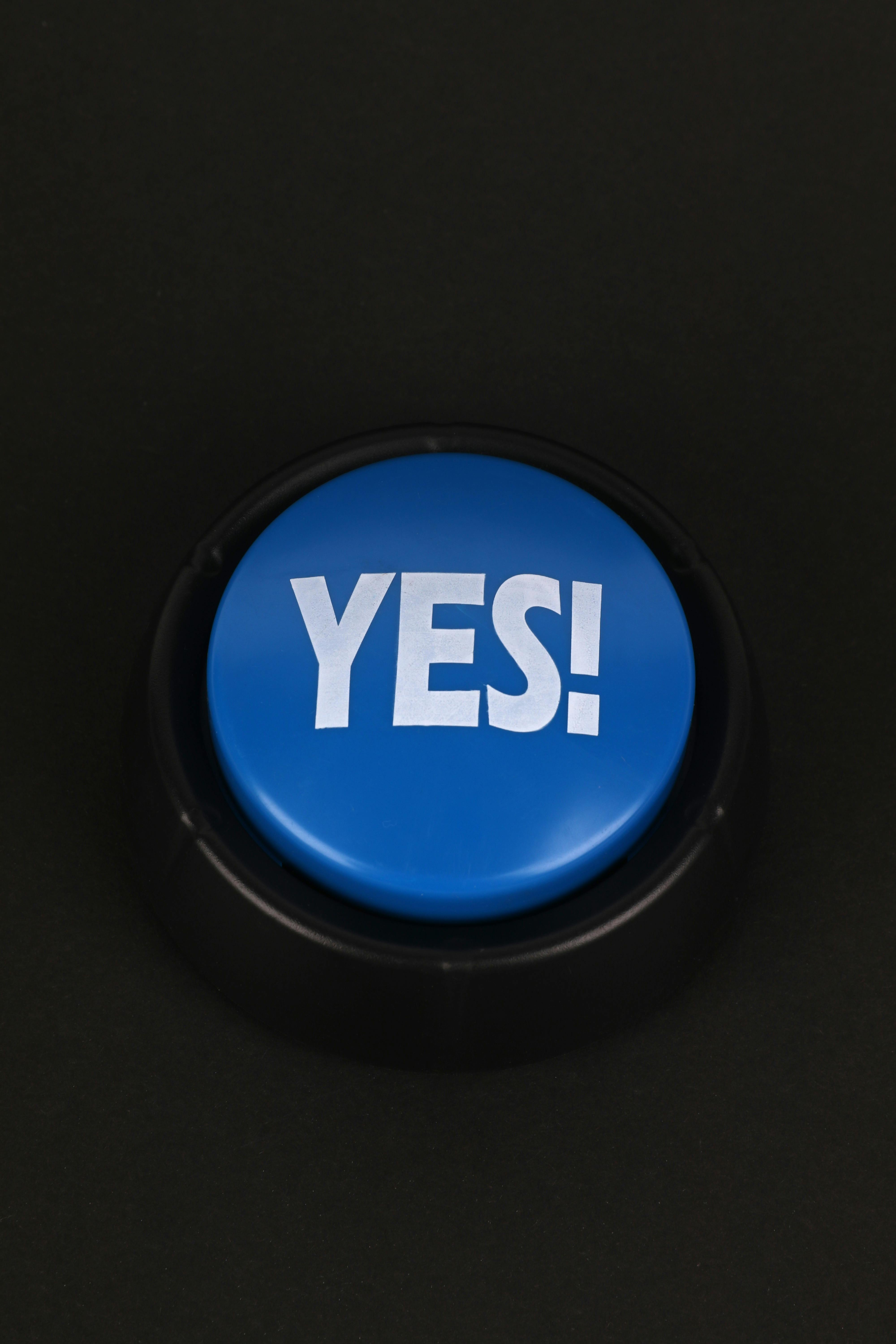 A Blue "Yes" Button and a Red "No" Button · Free Stock Photo