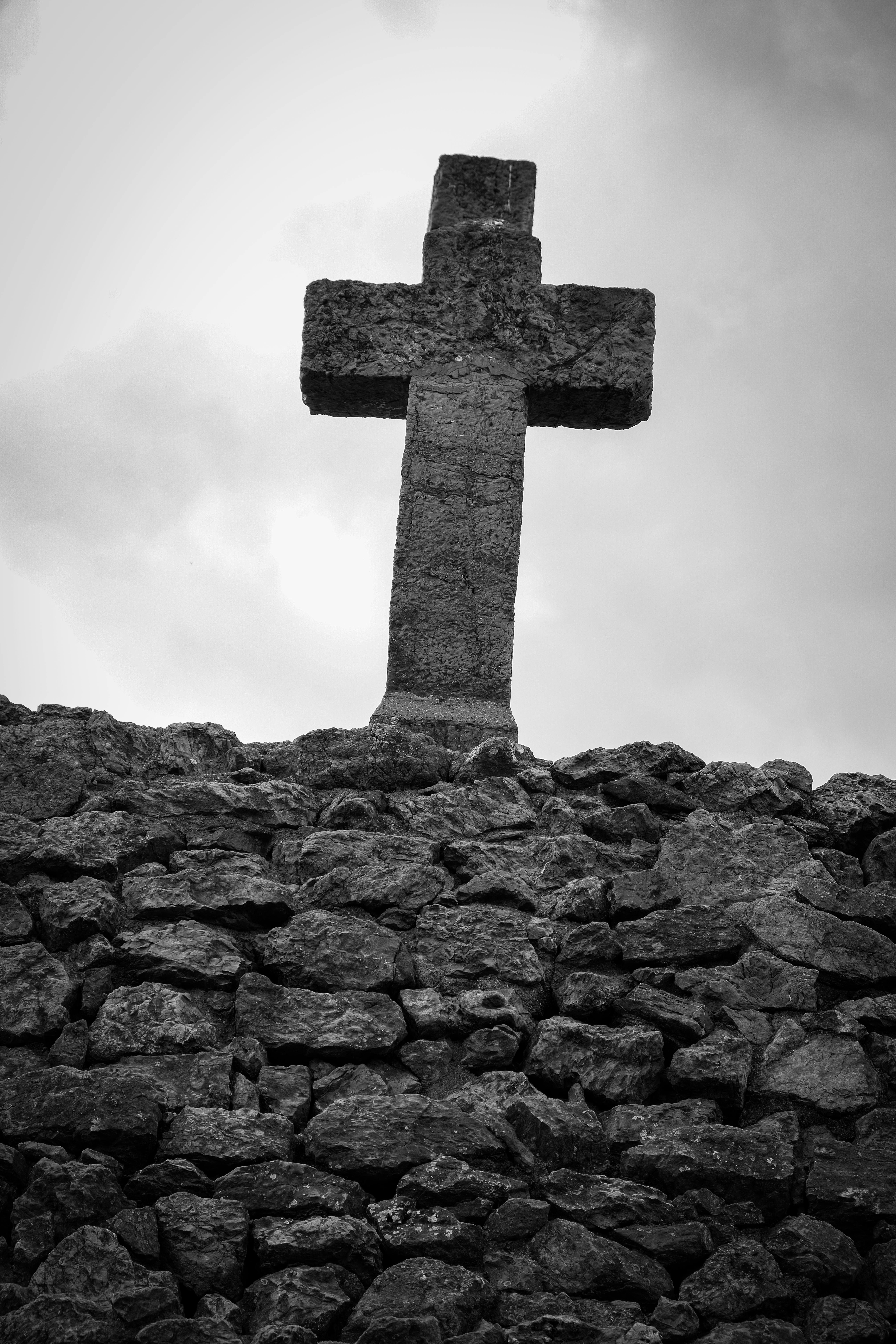 Stone Cross on Wall · Free Stock Photo