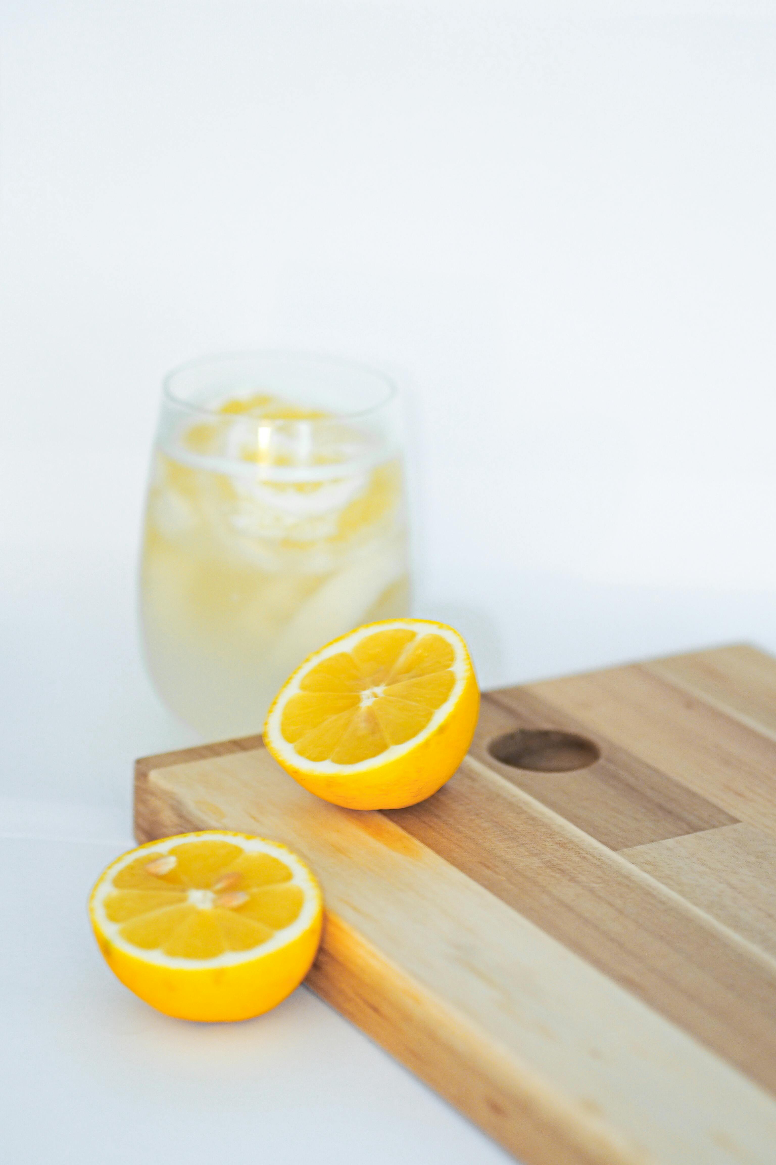 Yellow Lemonade on Clear Glass Saucer · Free Stock Photo