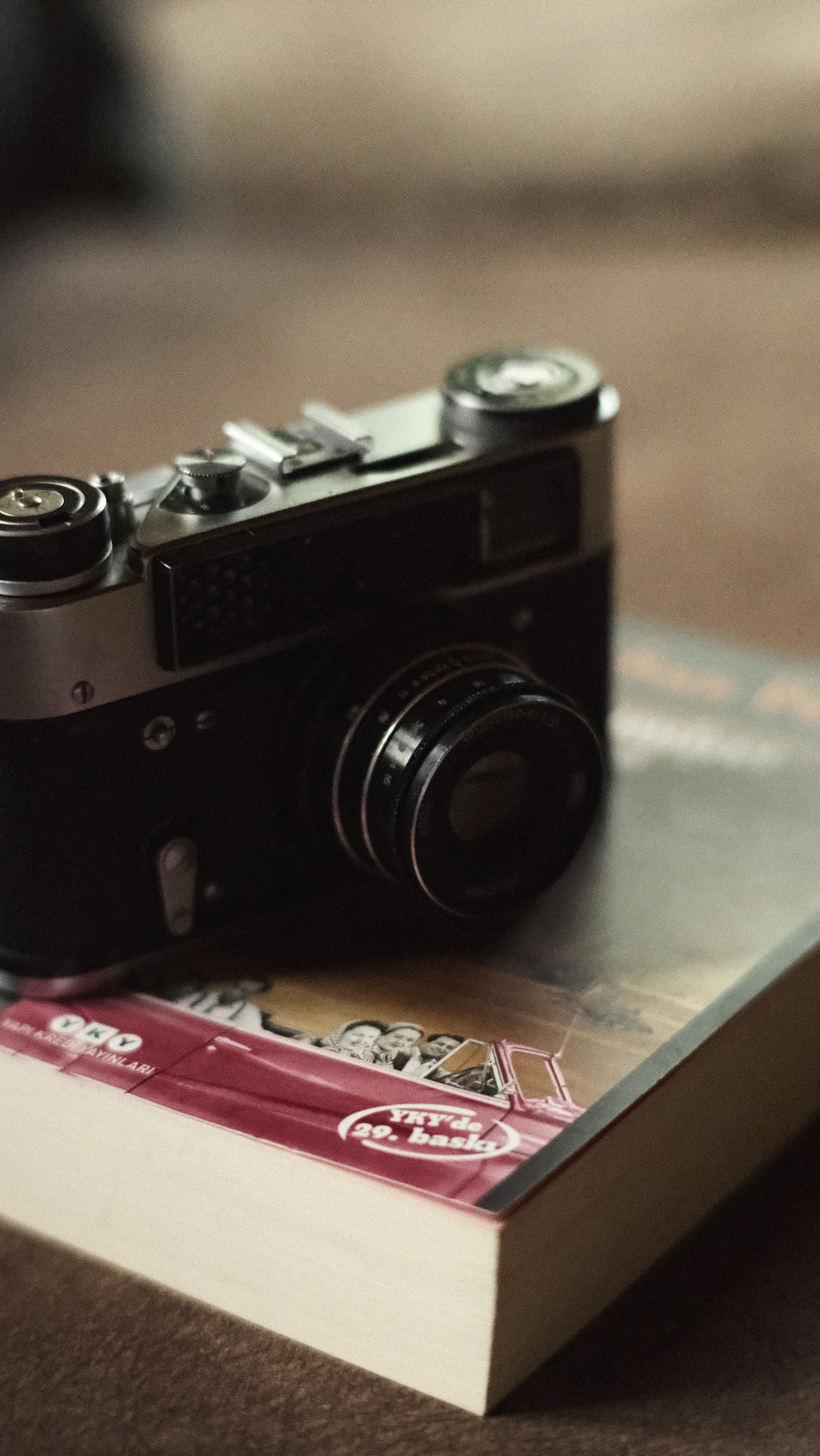 A Camera and a Book · Free Stock Photo