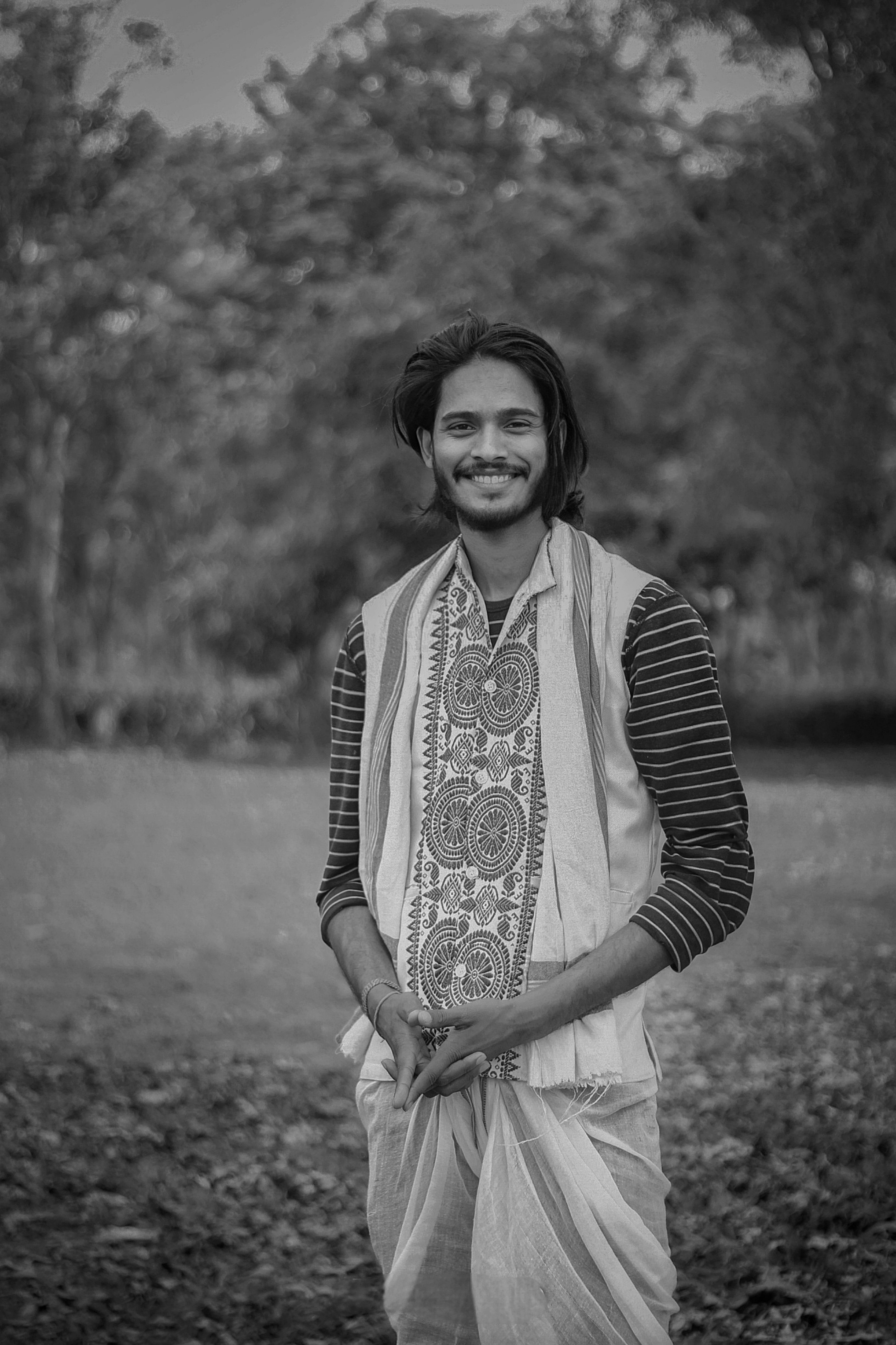 Photo of a Smiling Man in a Park · Free Stock Photo