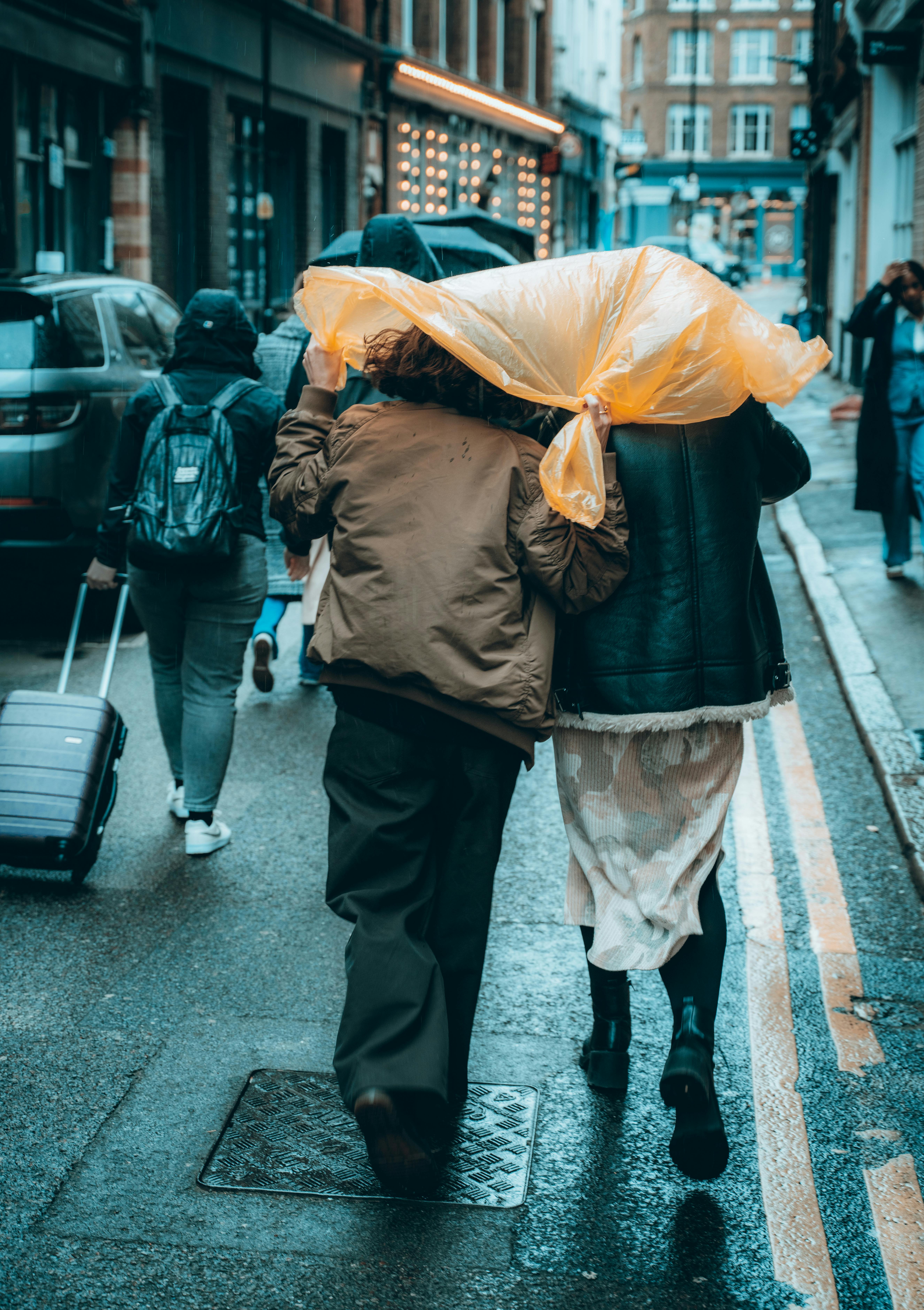 Back View of People Walking on Street · Free Stock Photo