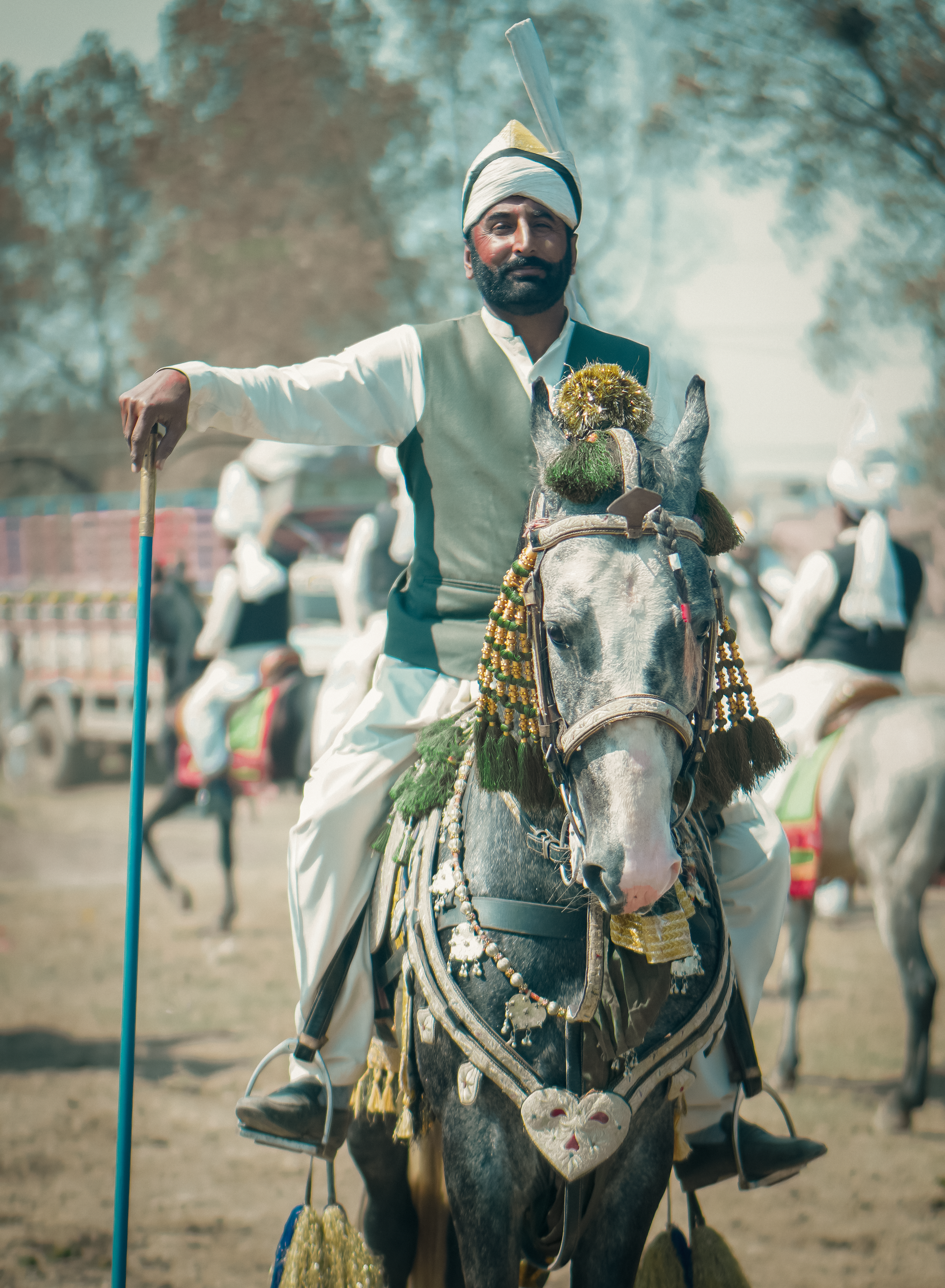 Bearded Man Riding a Horse Wearing a Decorative Bridle · Free Stock Photo