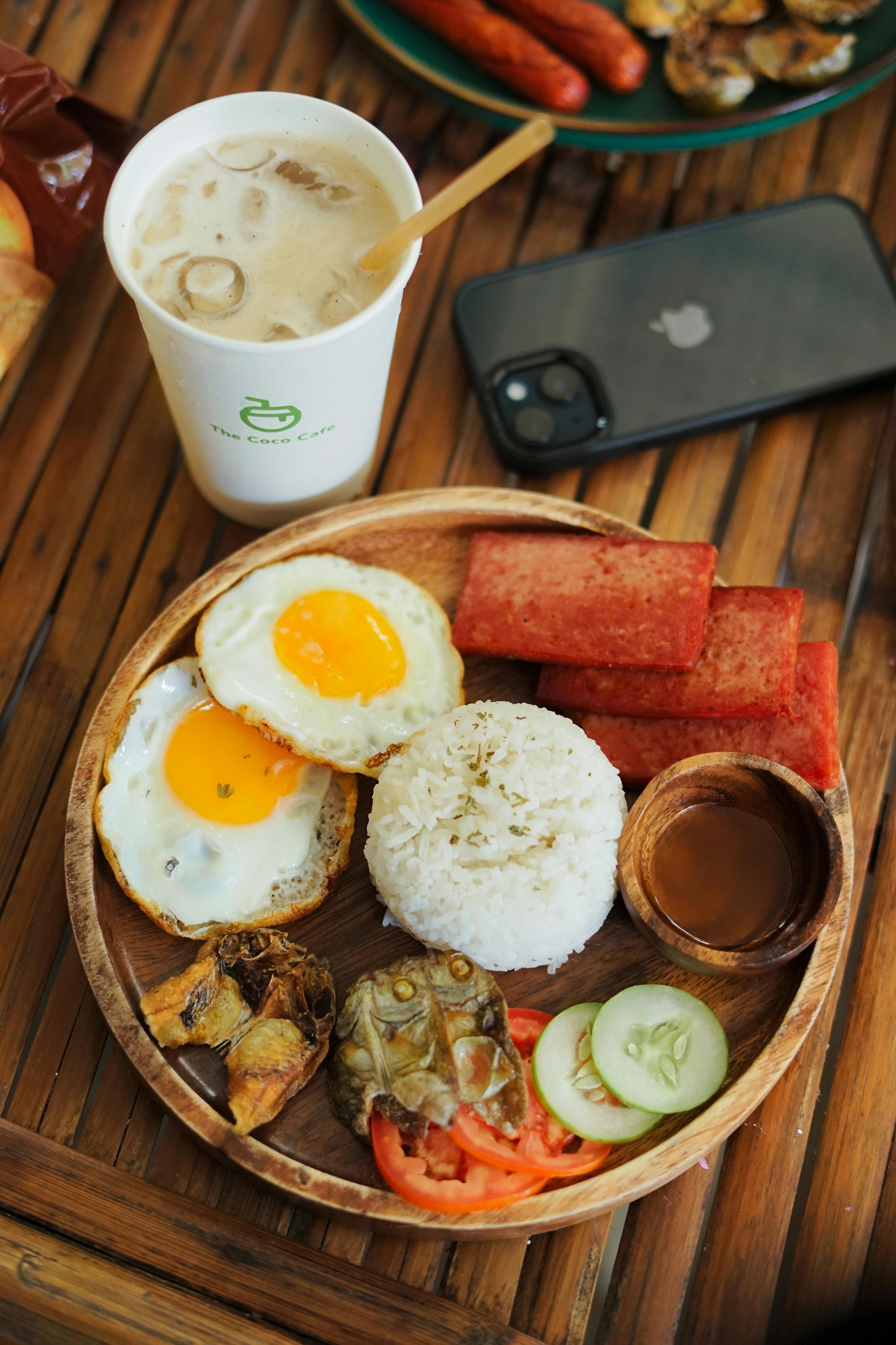 A Breakfast Dish with Eggs and Rice Served in a Restaurant · Free Stock ...