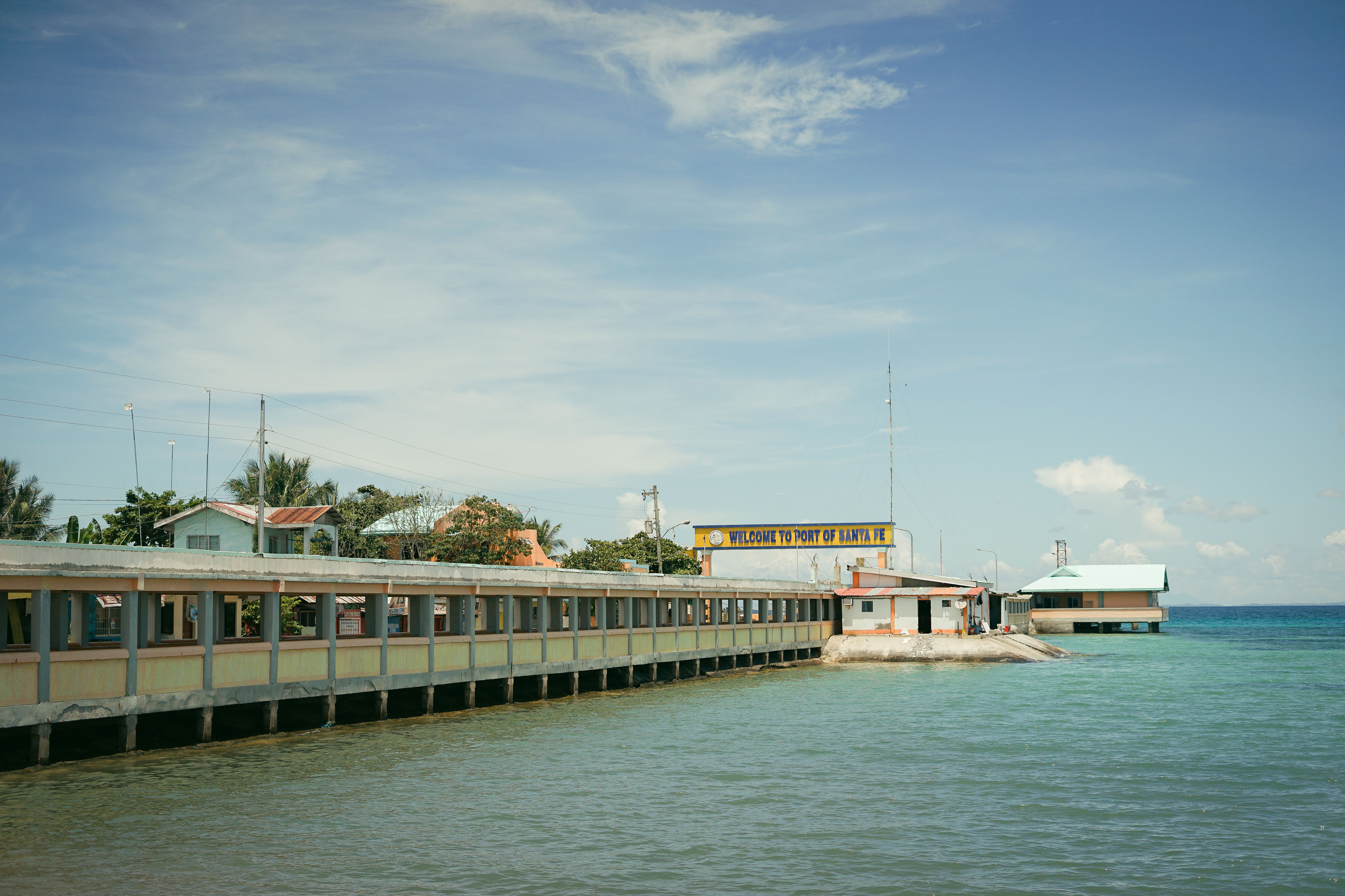 Wooden House on Pier on Sea Shore · Free Stock Photo