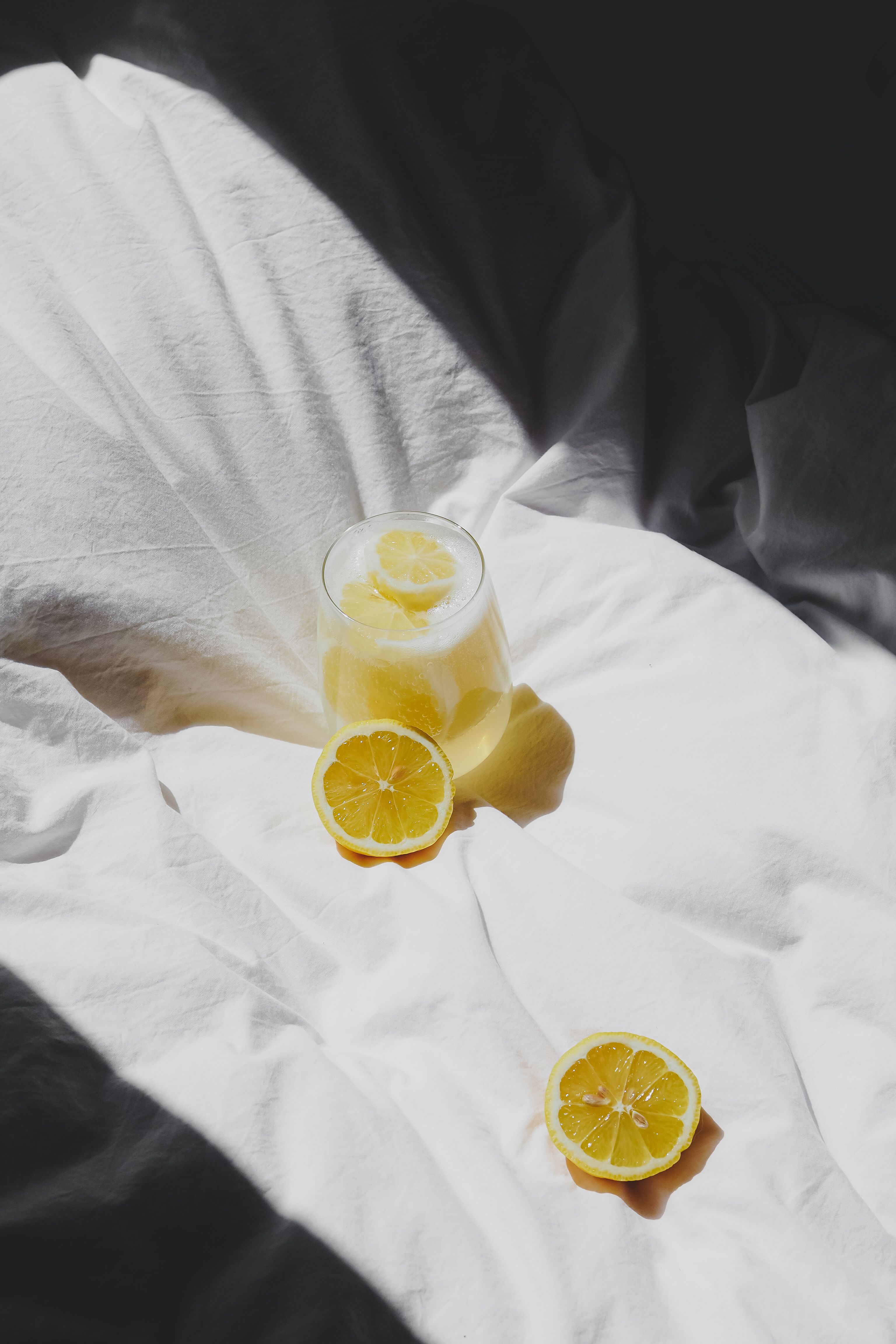 Four Lemon Fruits Forming Straight Line on a White Background · Free ...