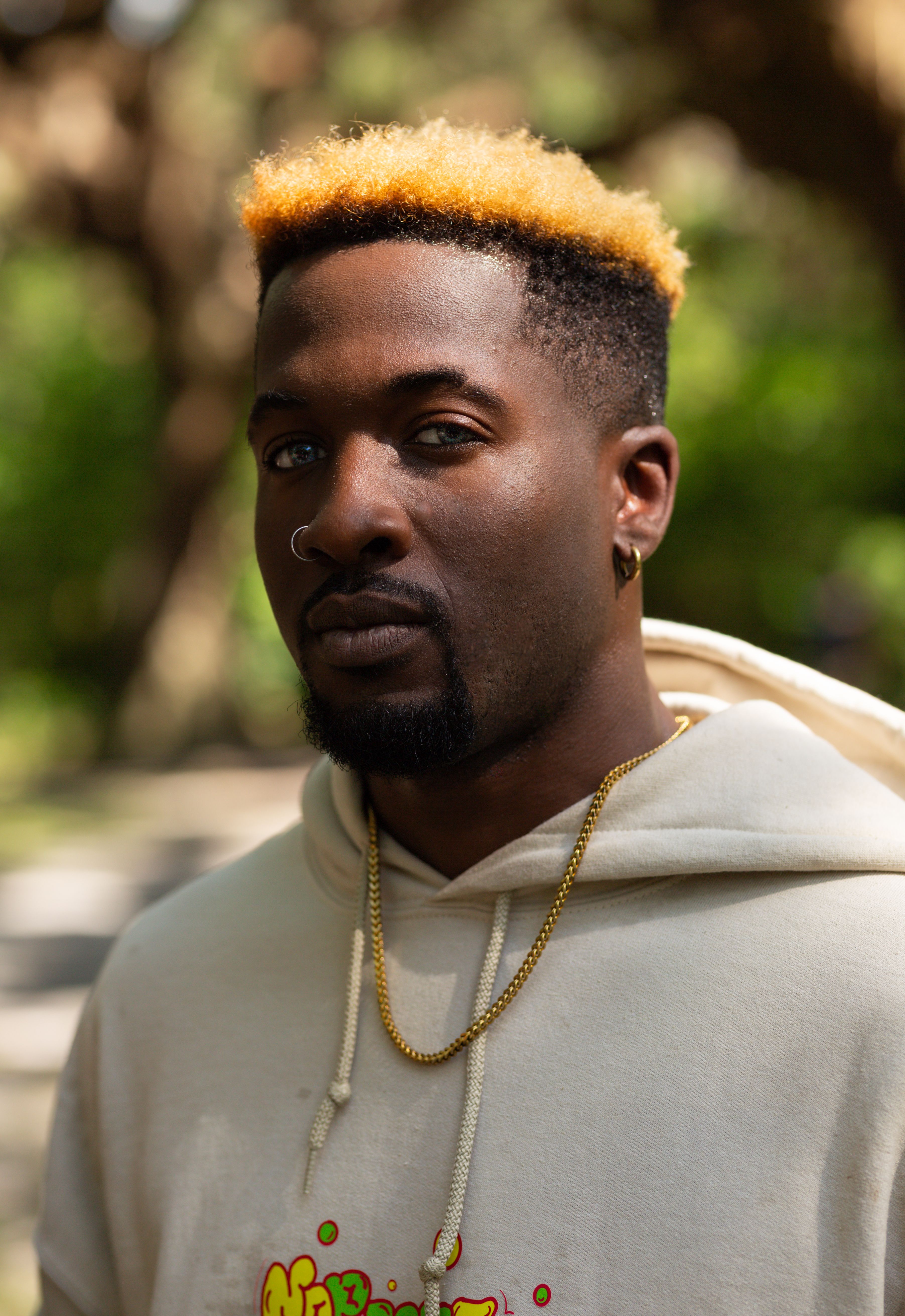 Portrait of an African Man in a Forest · Free Stock Photo