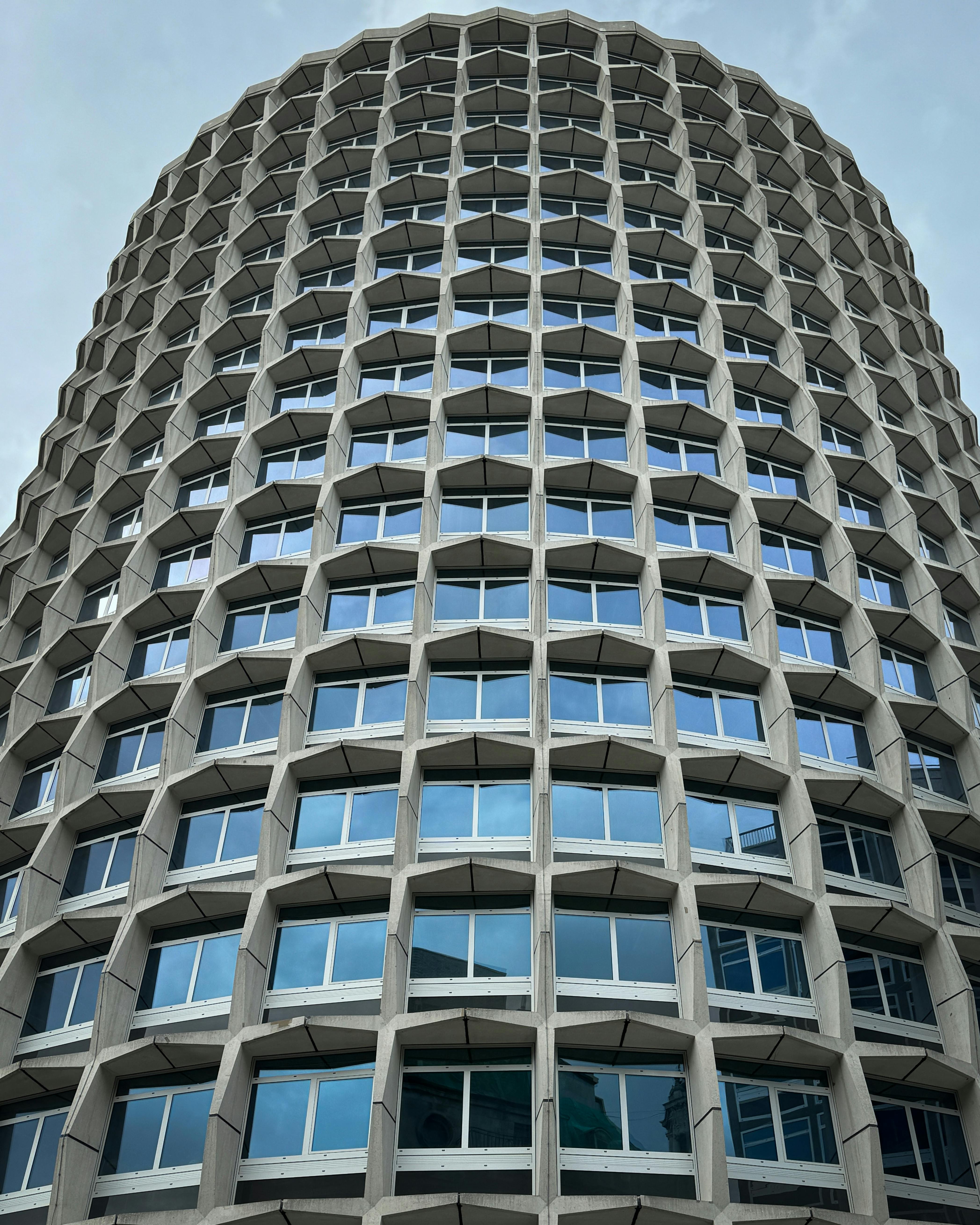 Modern Glass Building in Sunlight · Free Stock Photo