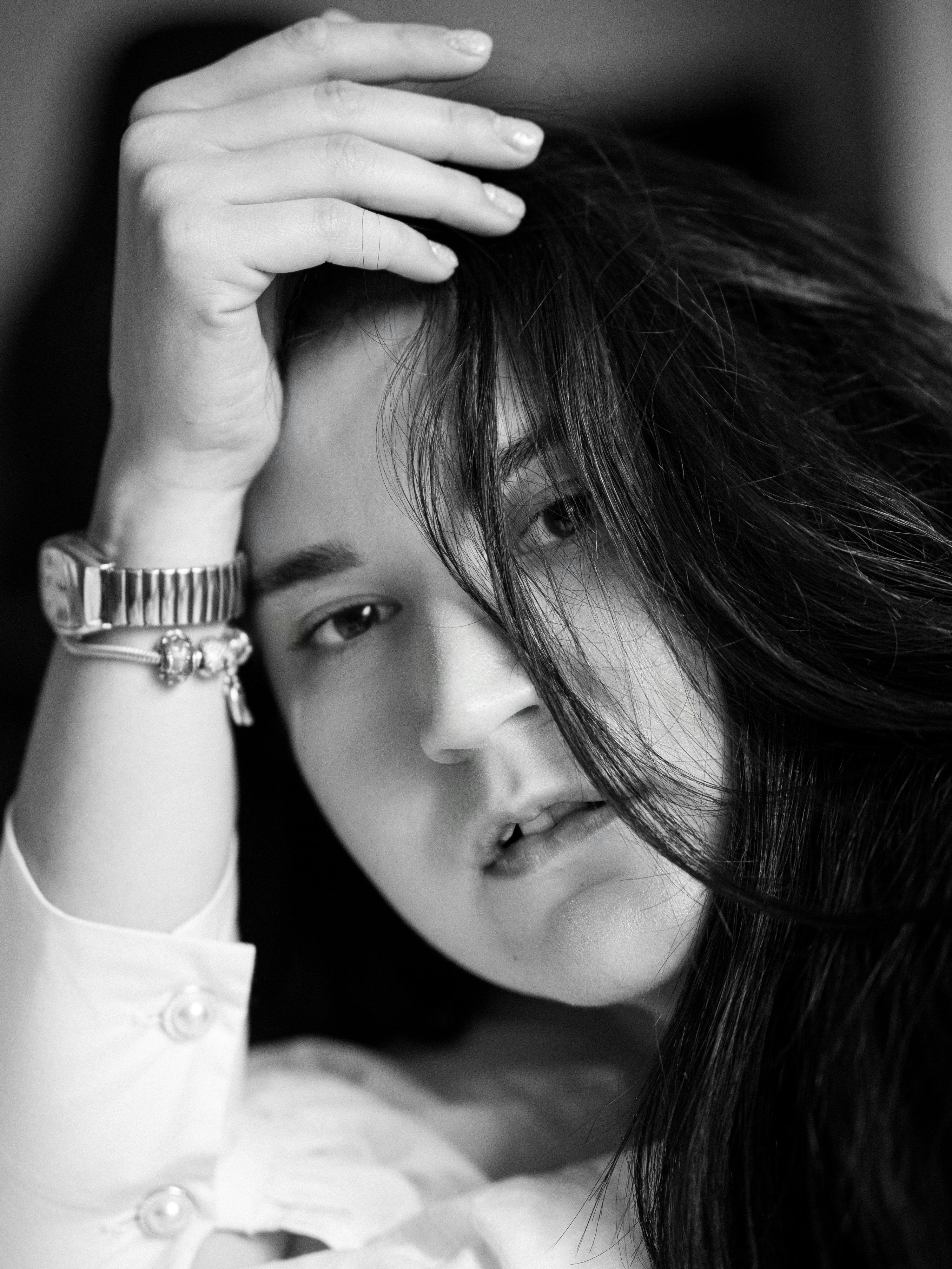 Portrait of Woman with Wristwatch · Free Stock Photo