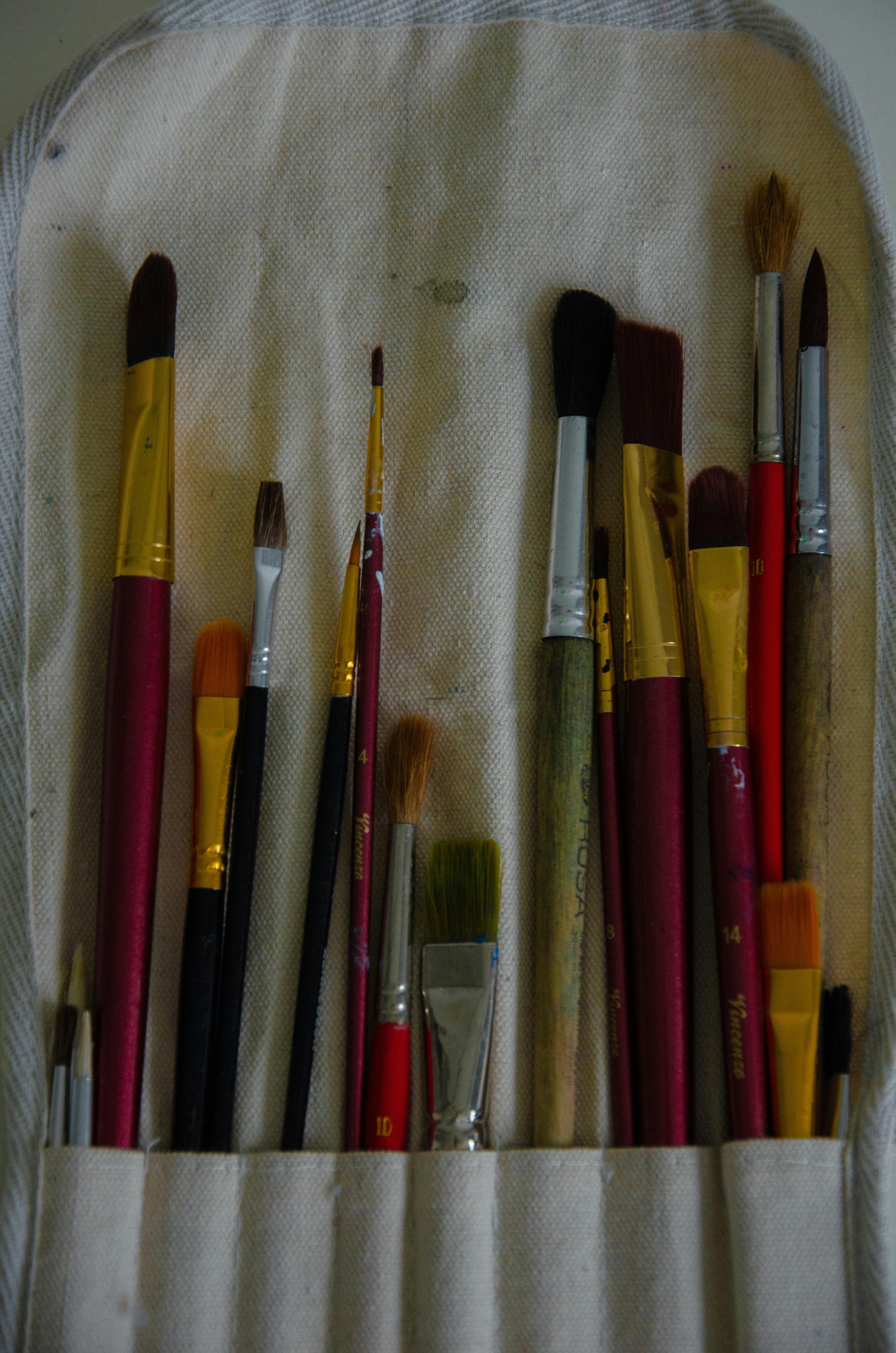 Crop artist with paintbrush in studio · Free Stock Photo