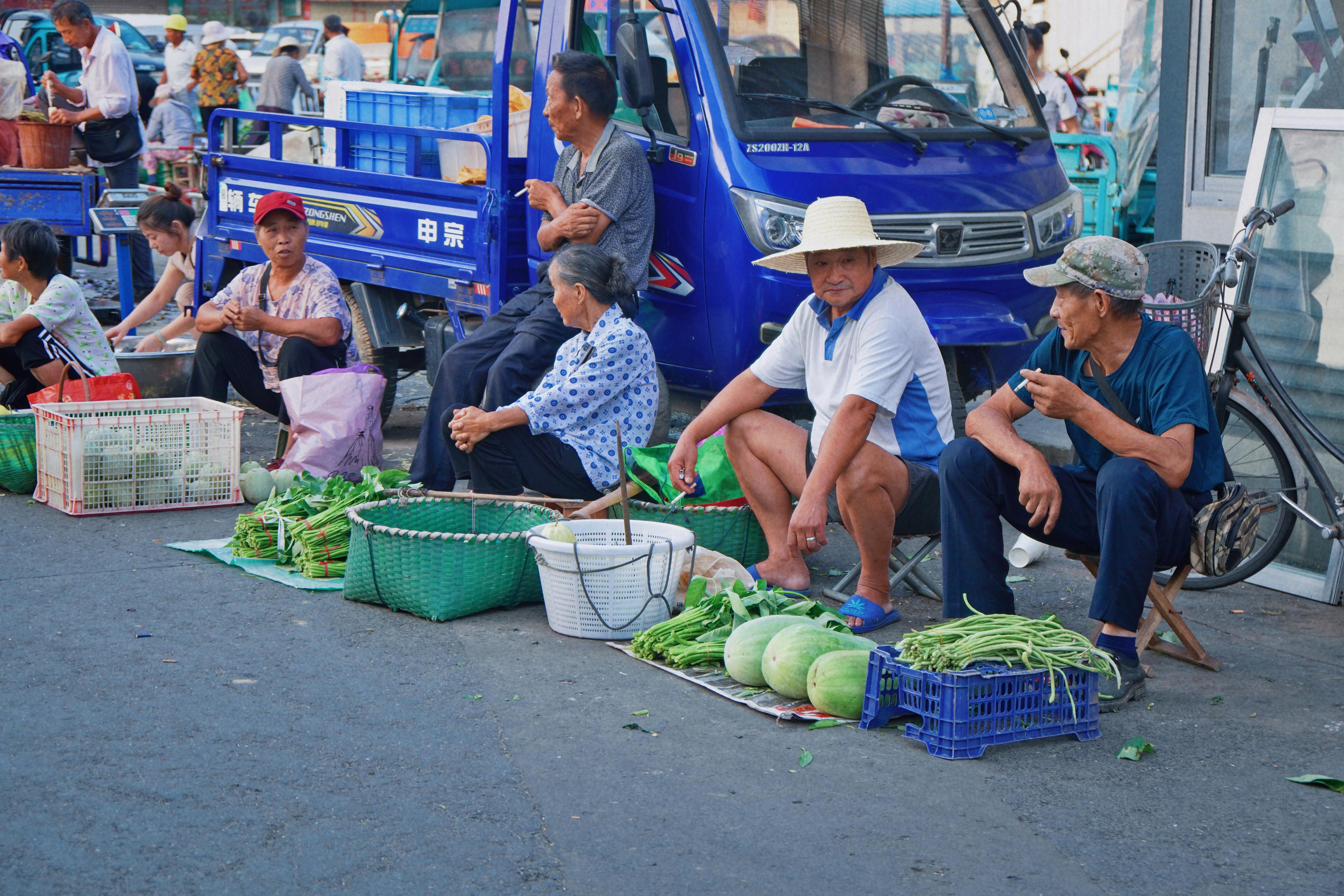 Farmers Selling Vegetables at the Market · Free Stock Photo