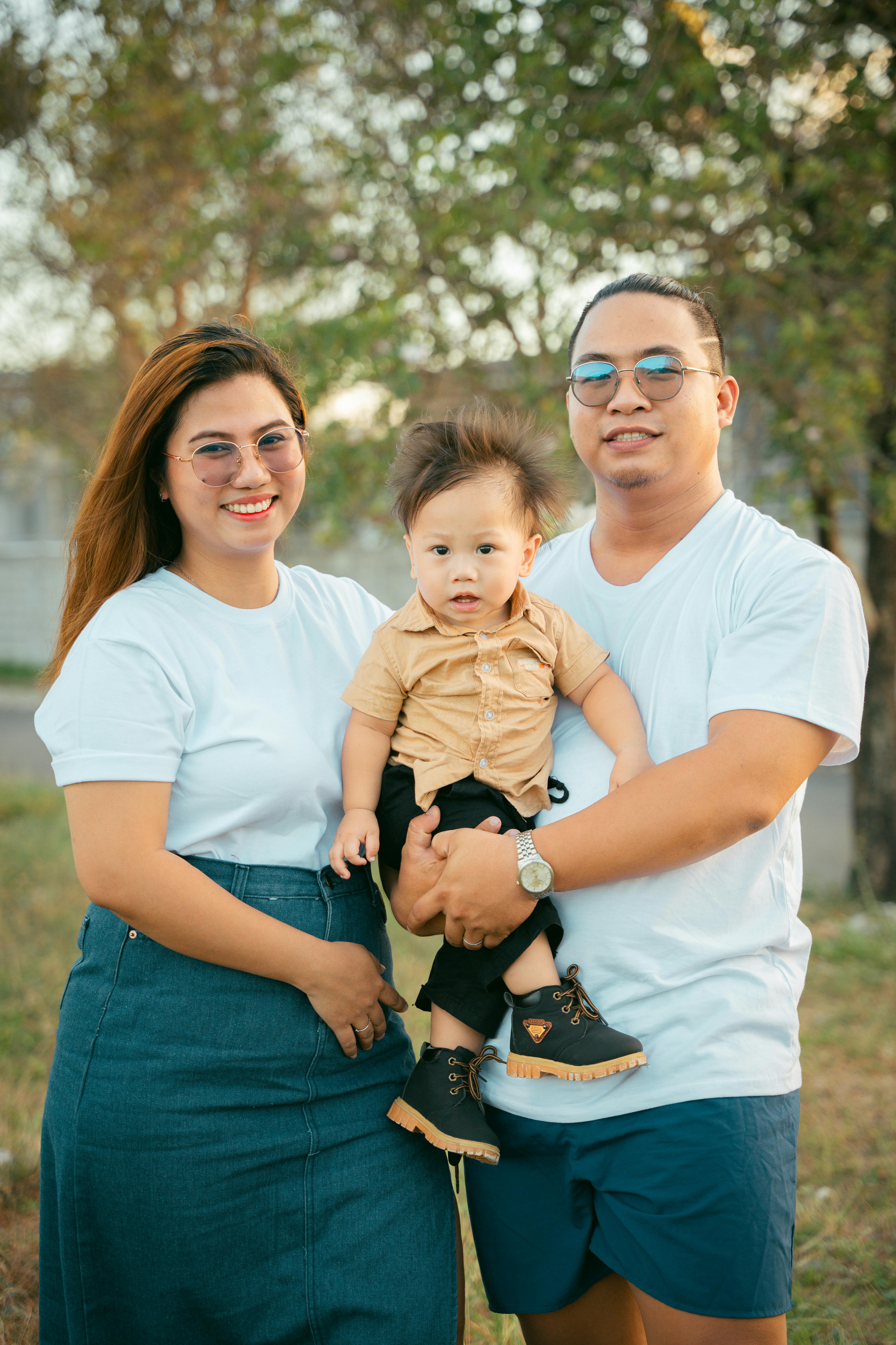 Portrait of Father and Mother with Son · Free Stock Photo