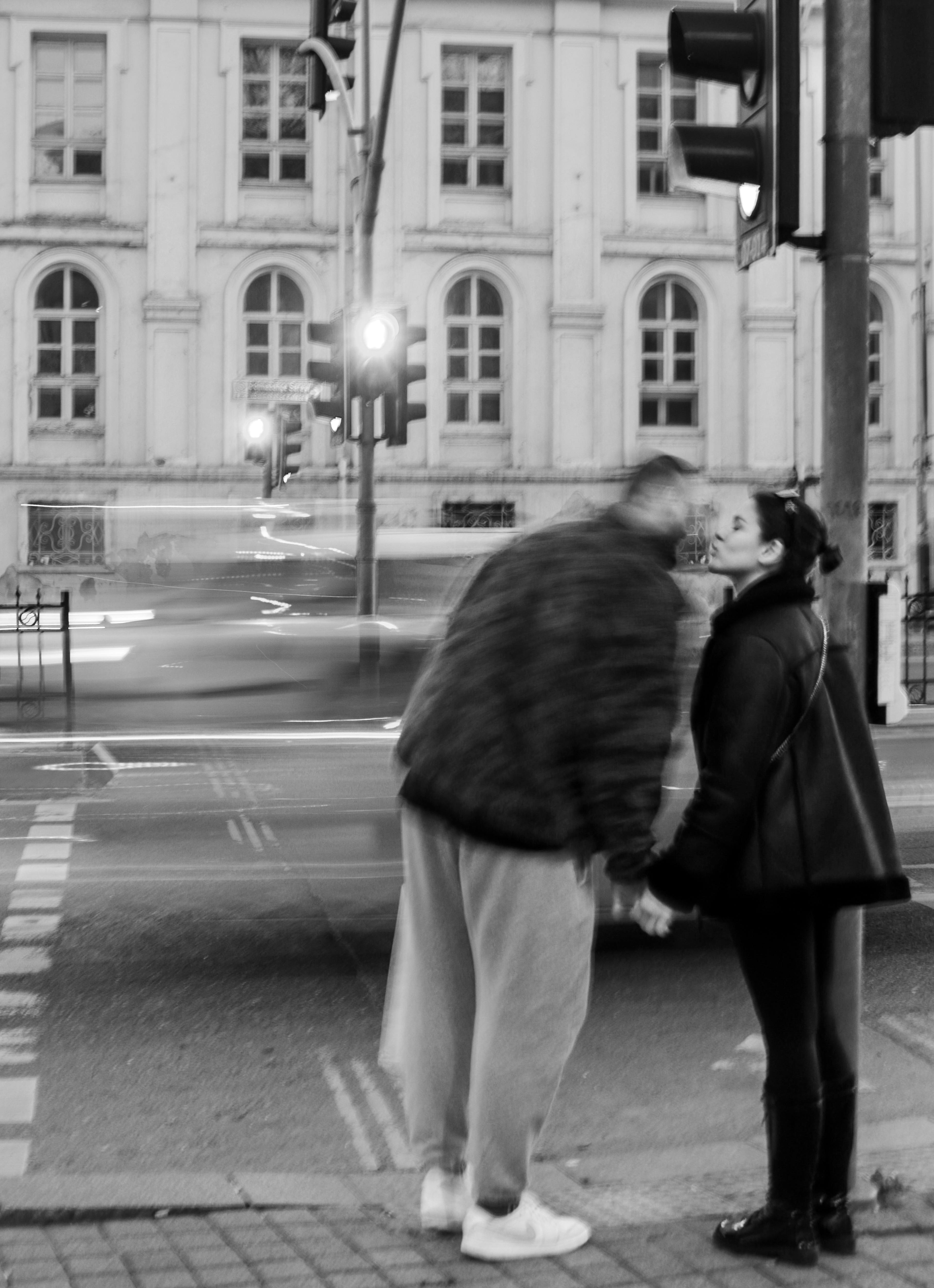 Couple Kissing on a Street in Black and White · Free Stock Photo