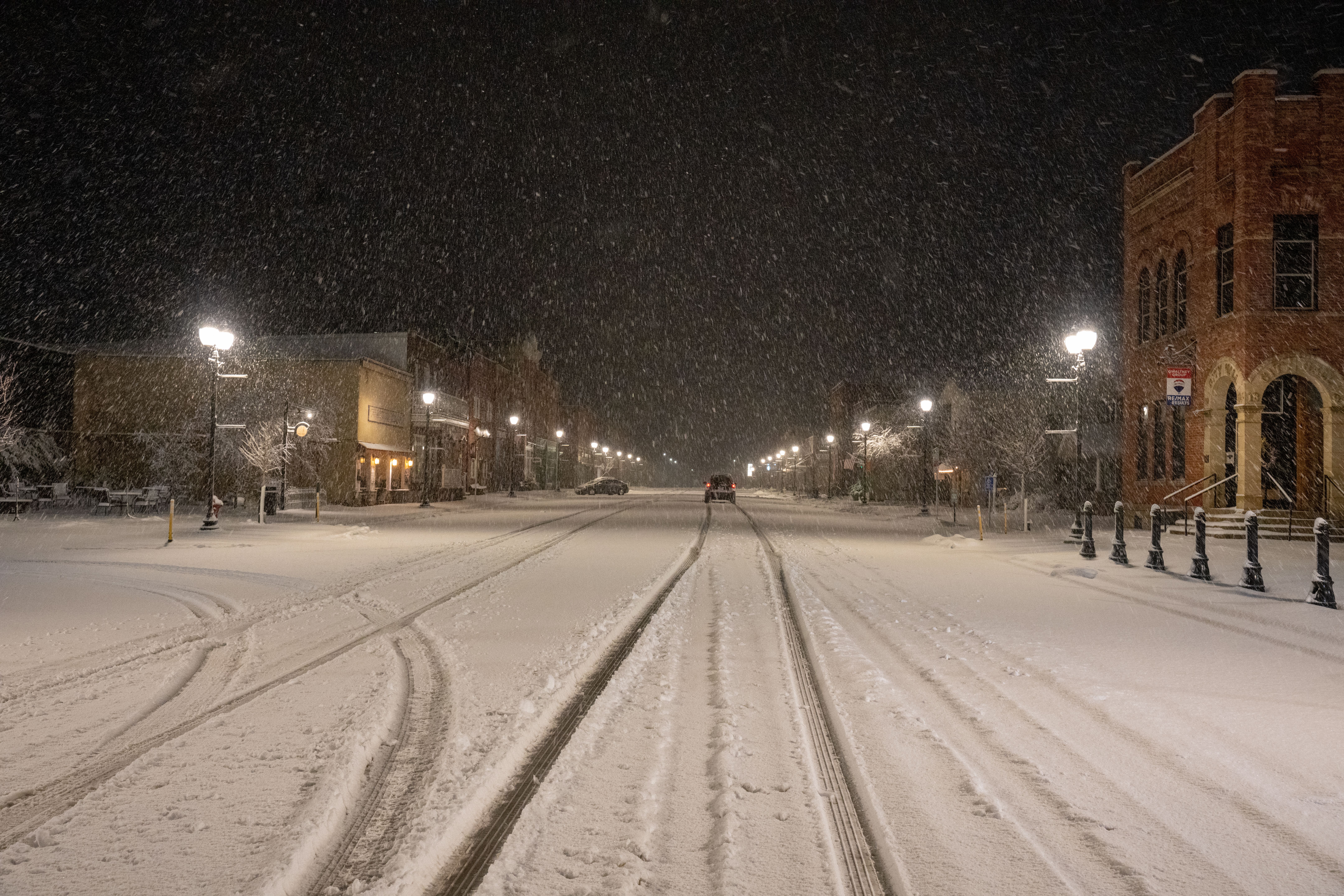 Road in a City Covered with Snow at Night · Free Stock Photo