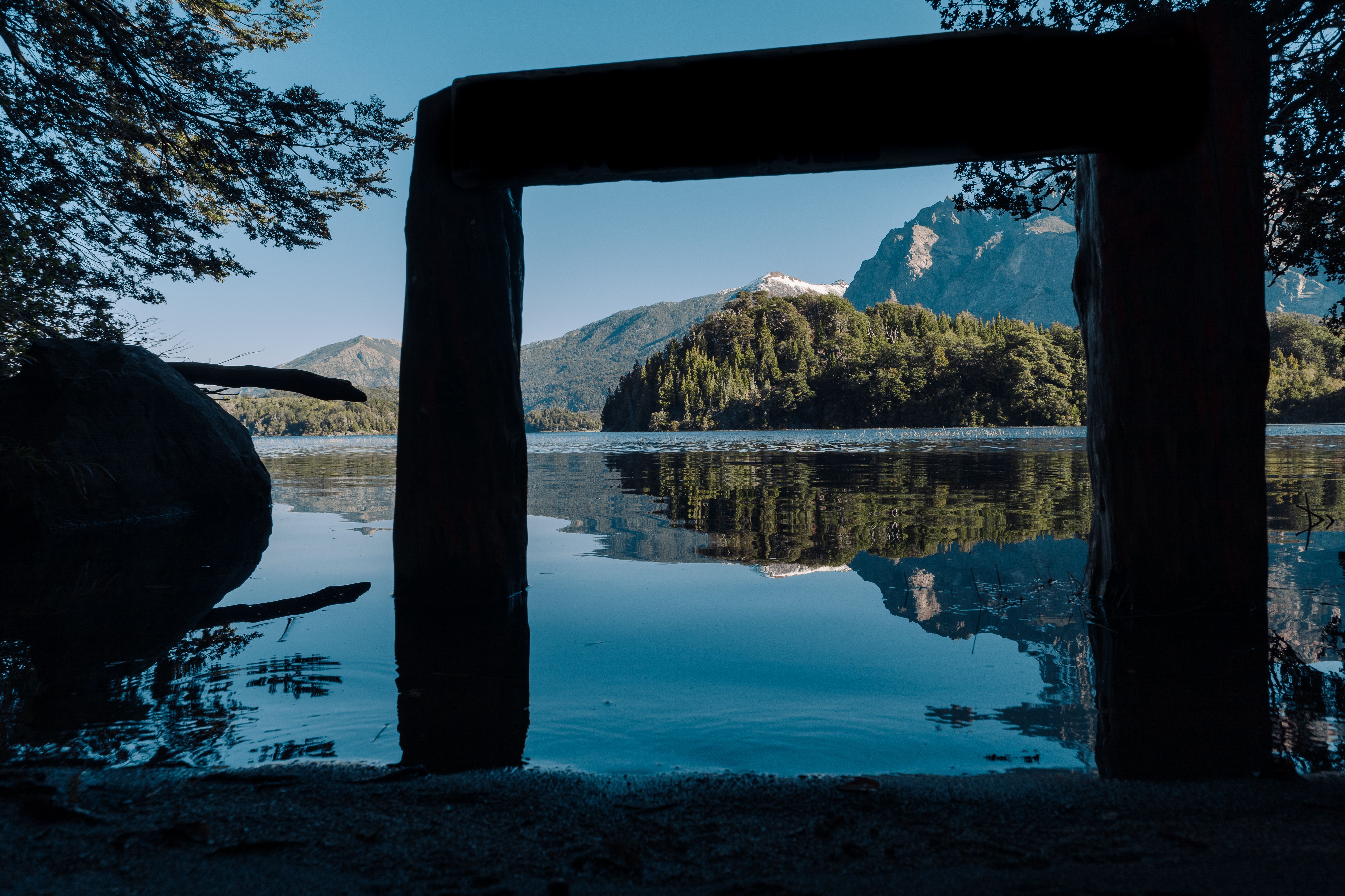 Stone Arch on a Pier by the Lake · Free Stock Photo