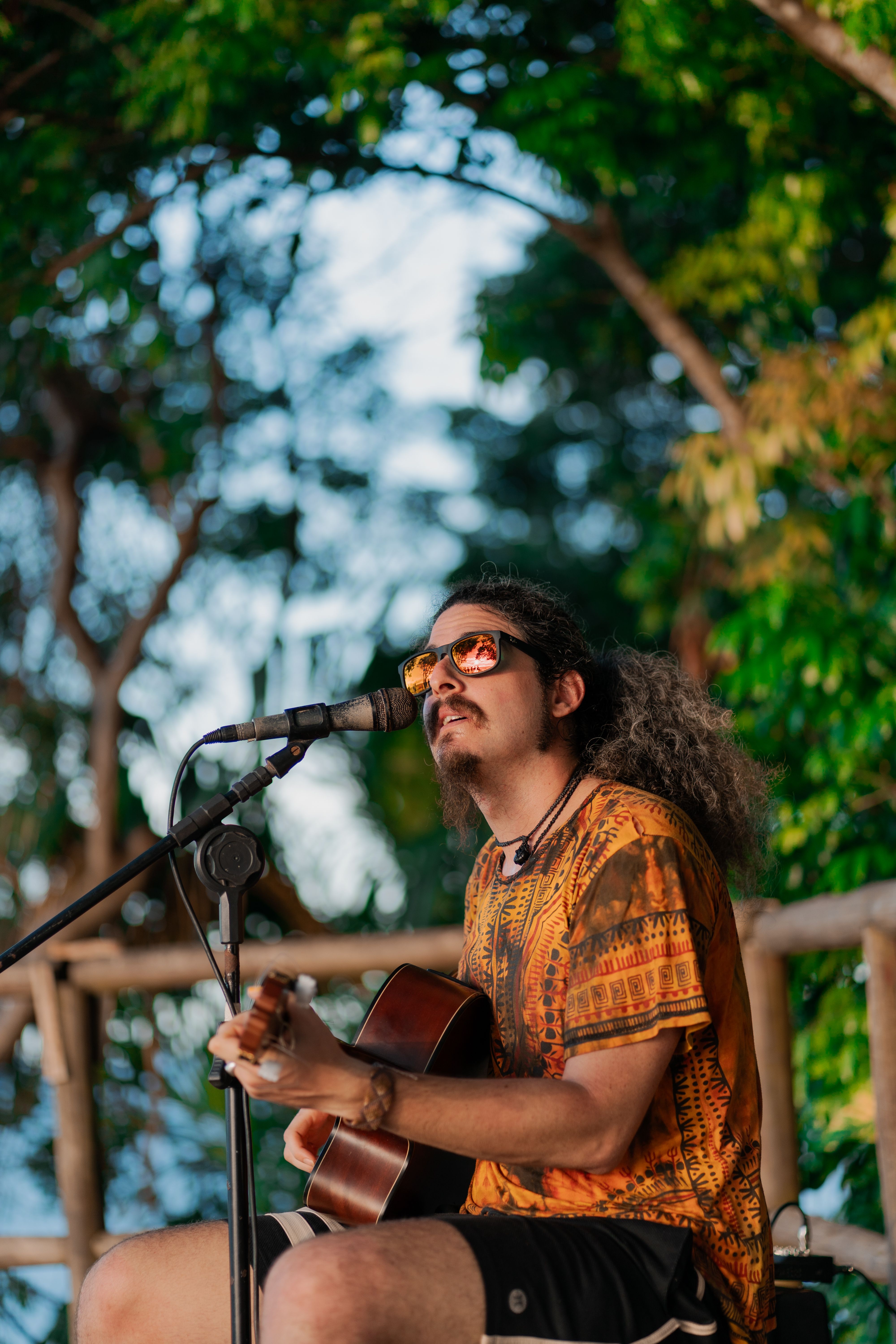 Man Singing Among Trees · Free Stock Photo