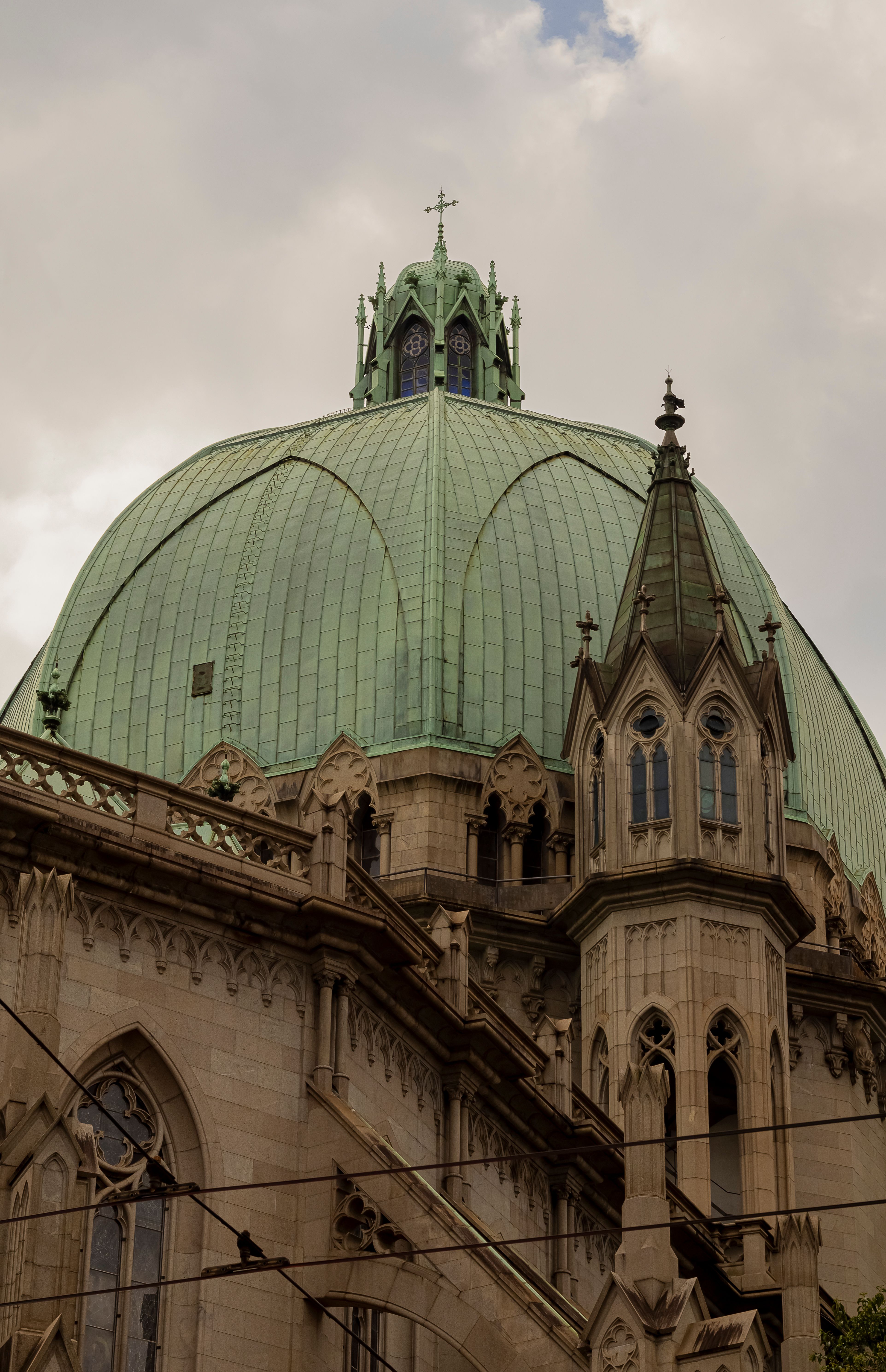 A clock tower with a green dome on top · Free Stock Photo