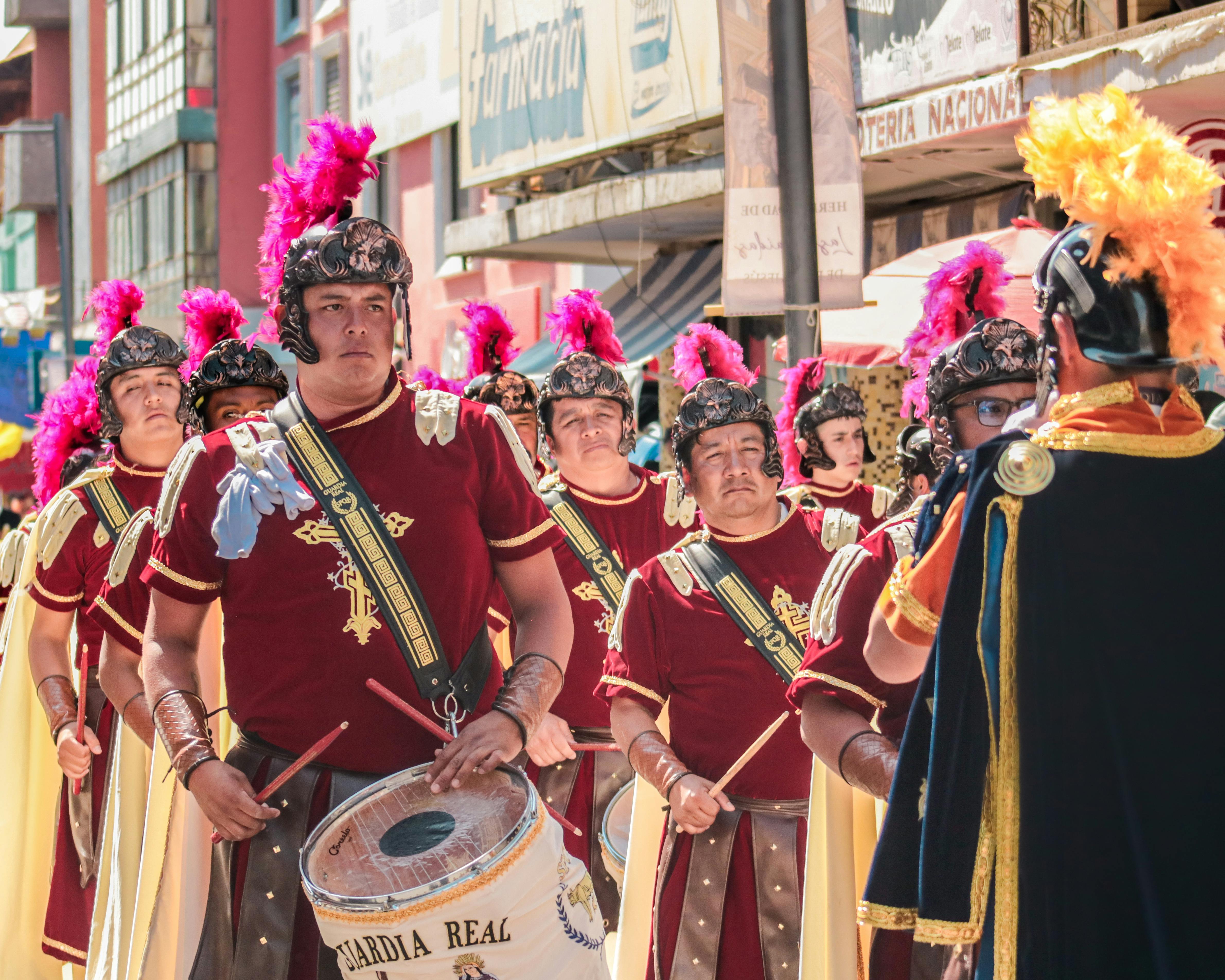 Men Wearing Traditional Dress at a Parade · Free Stock Photo