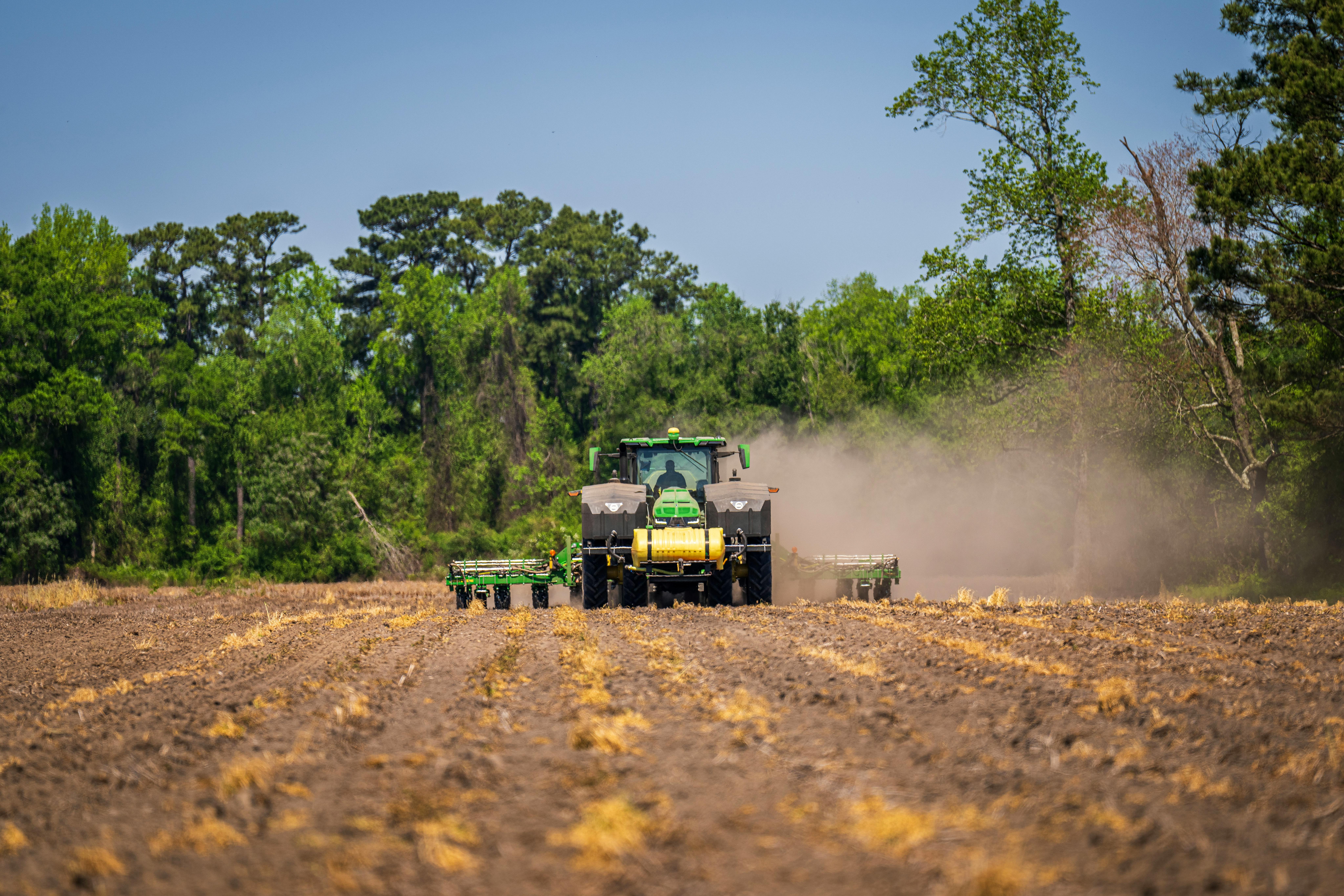 Tractor Plowing Field · Free Stock Photo