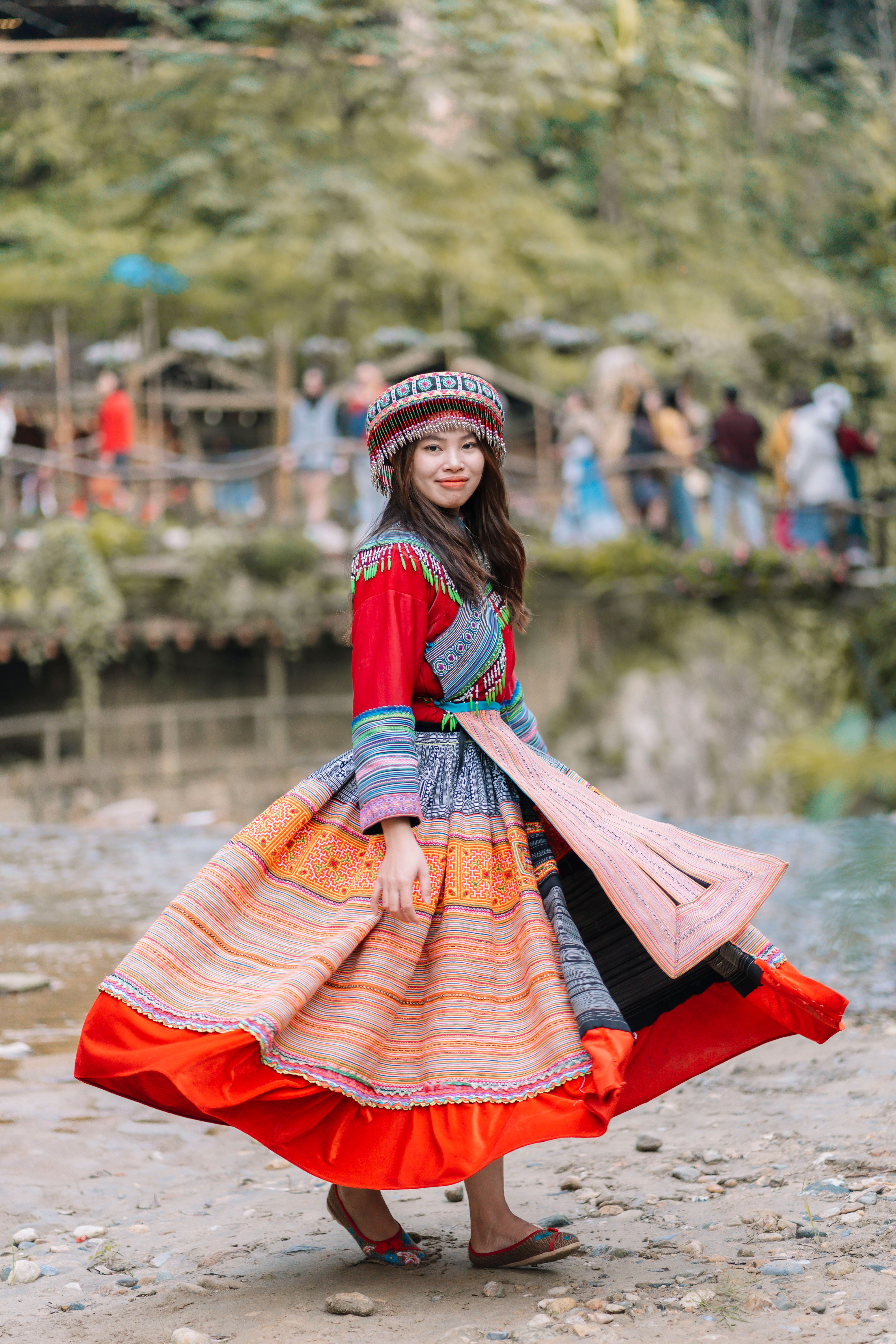 Portrait of a Pretty Brunette Wearing a Traditional Dress and a Hat ...