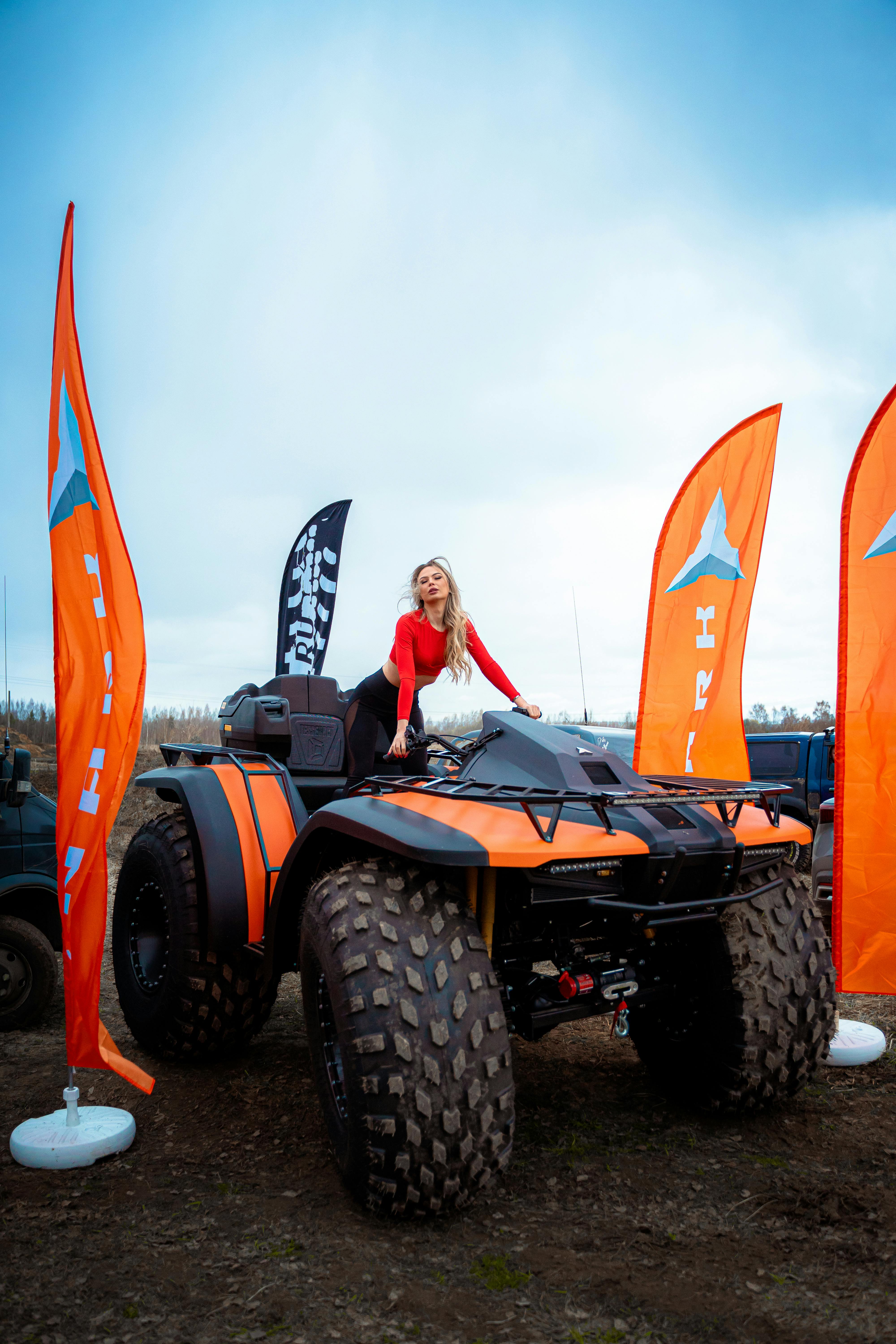 Woman Posing on Quad · Free Stock Photo