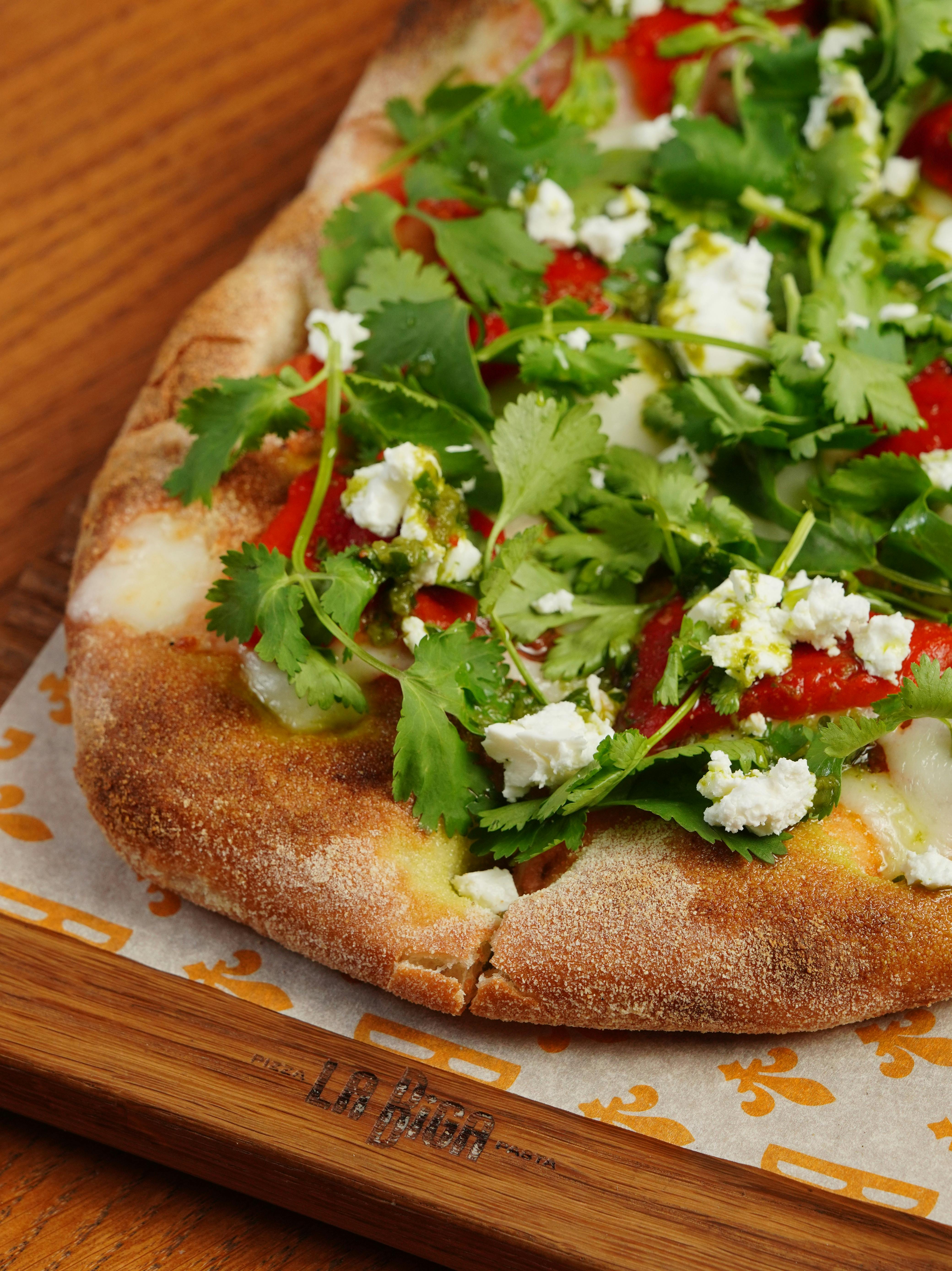 Close-up of Pinsa with Greens and Ricotta Cheese · Free Stock Photo