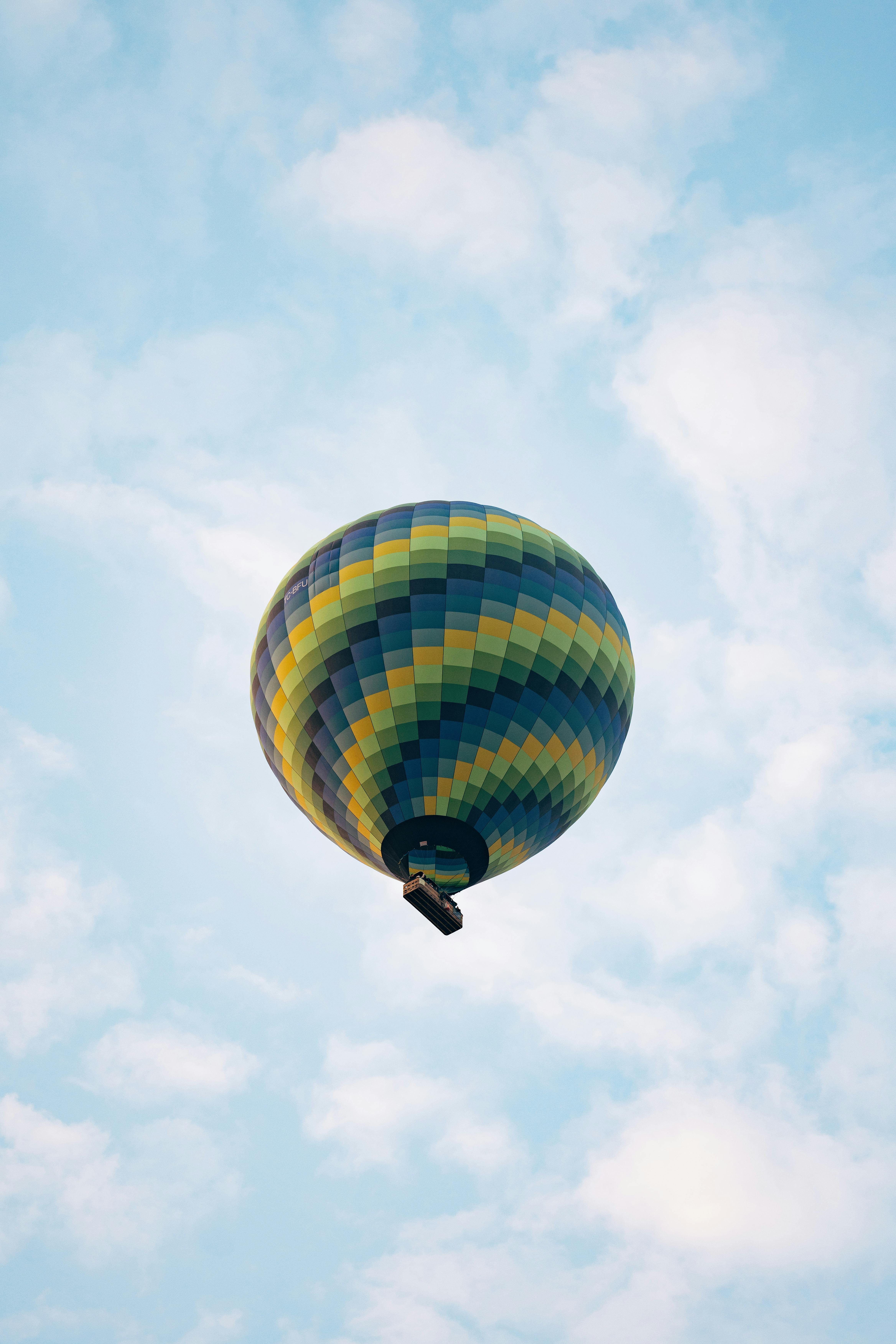 Hot Air Balloons Flying Above the Valley · Free Stock Photo