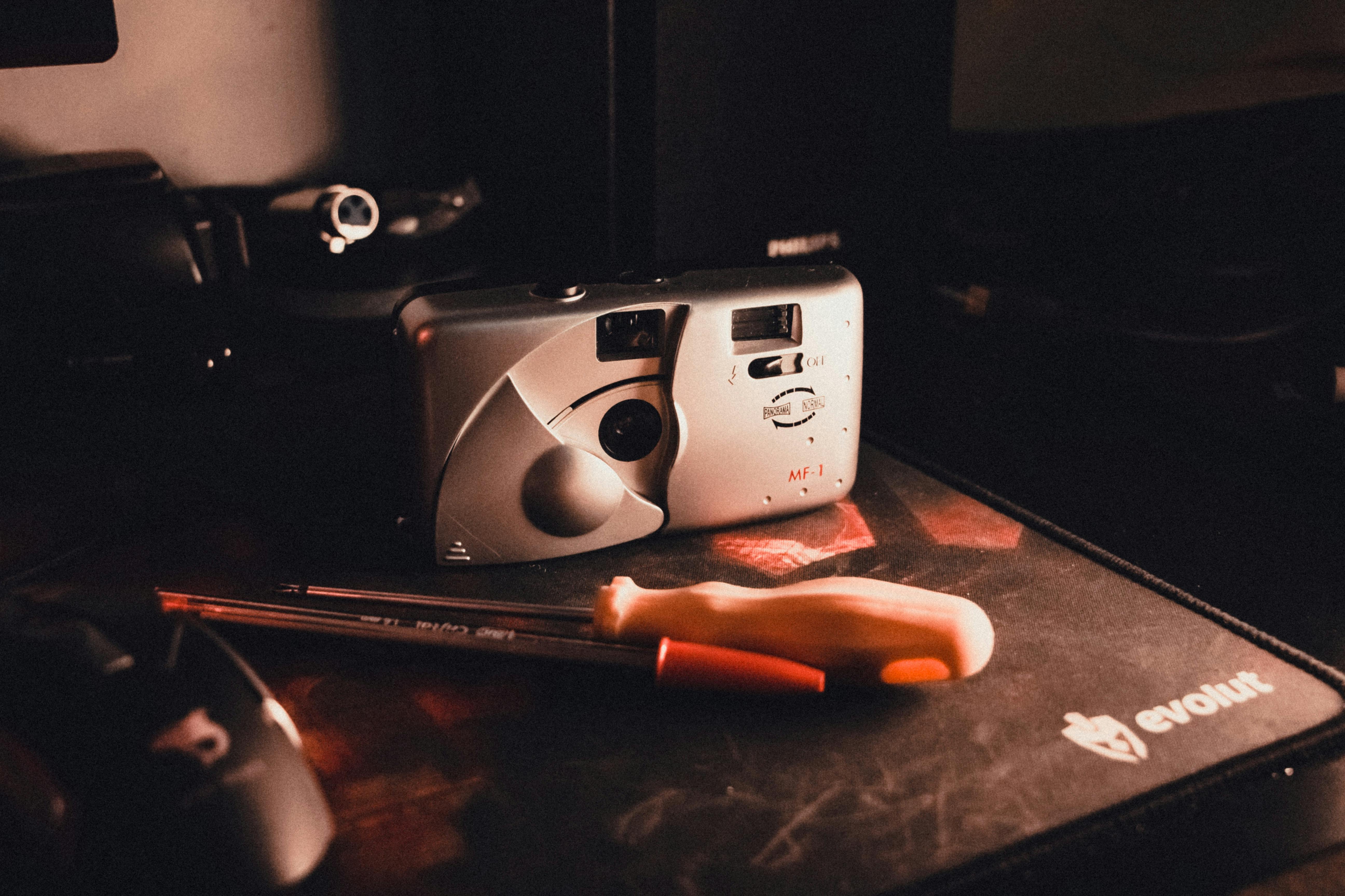 Suprema IMP Analog Film Camera on a Table · Free Stock Photo