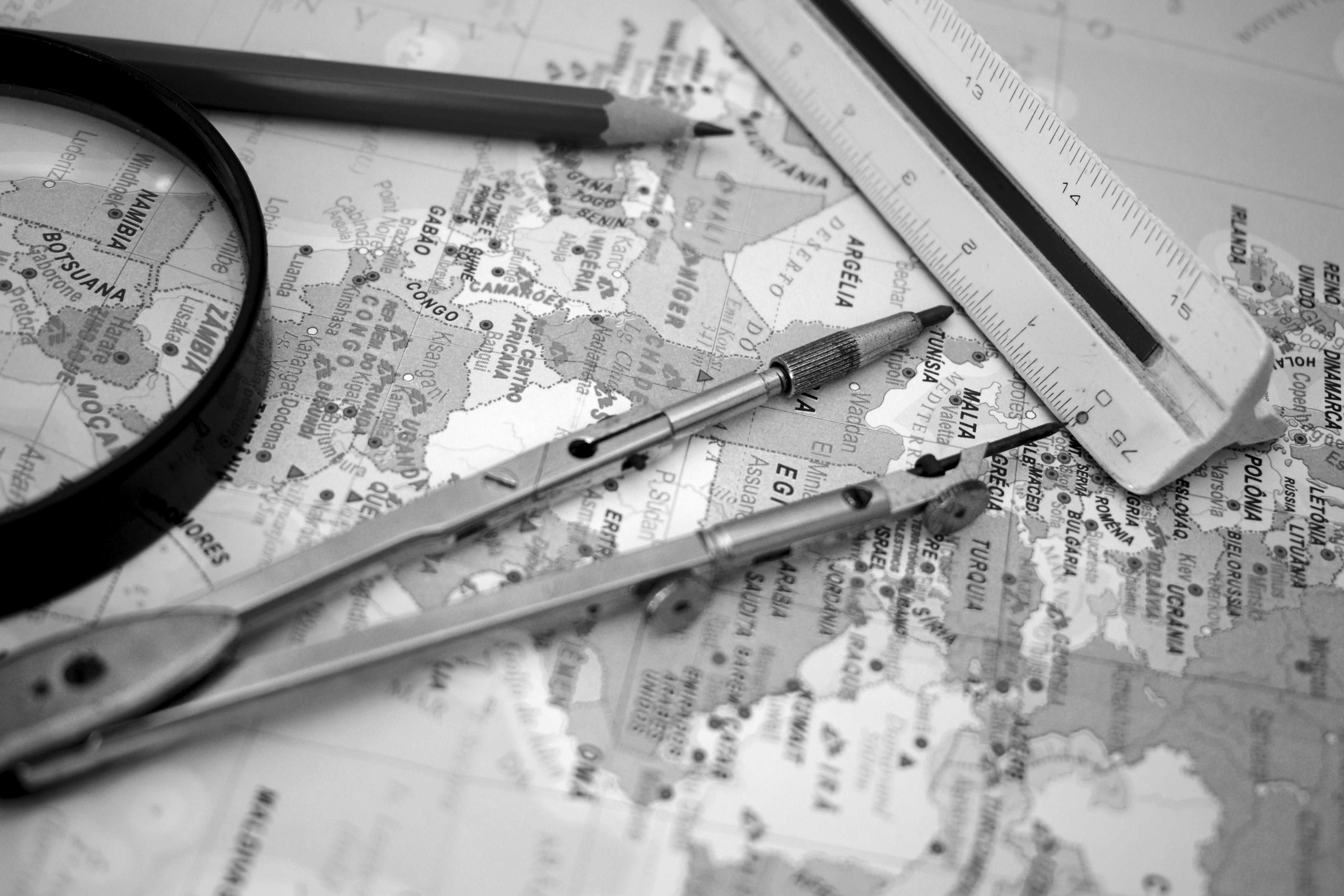 Ruler, Pen and Compass on Map · Free Stock Photo