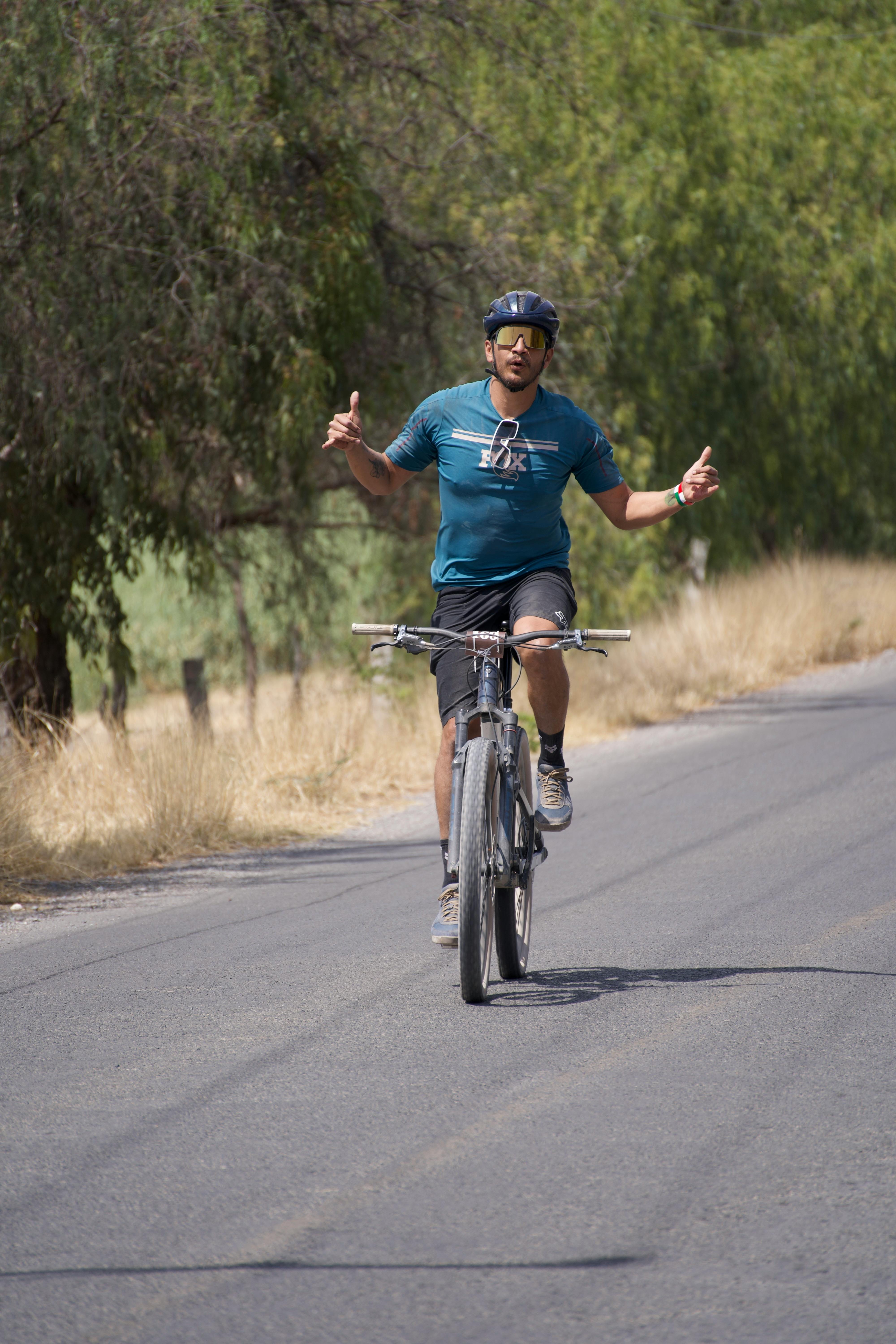 Man Riding Black Mountain Bike on Pathway during Daytime · Free Stock Photo