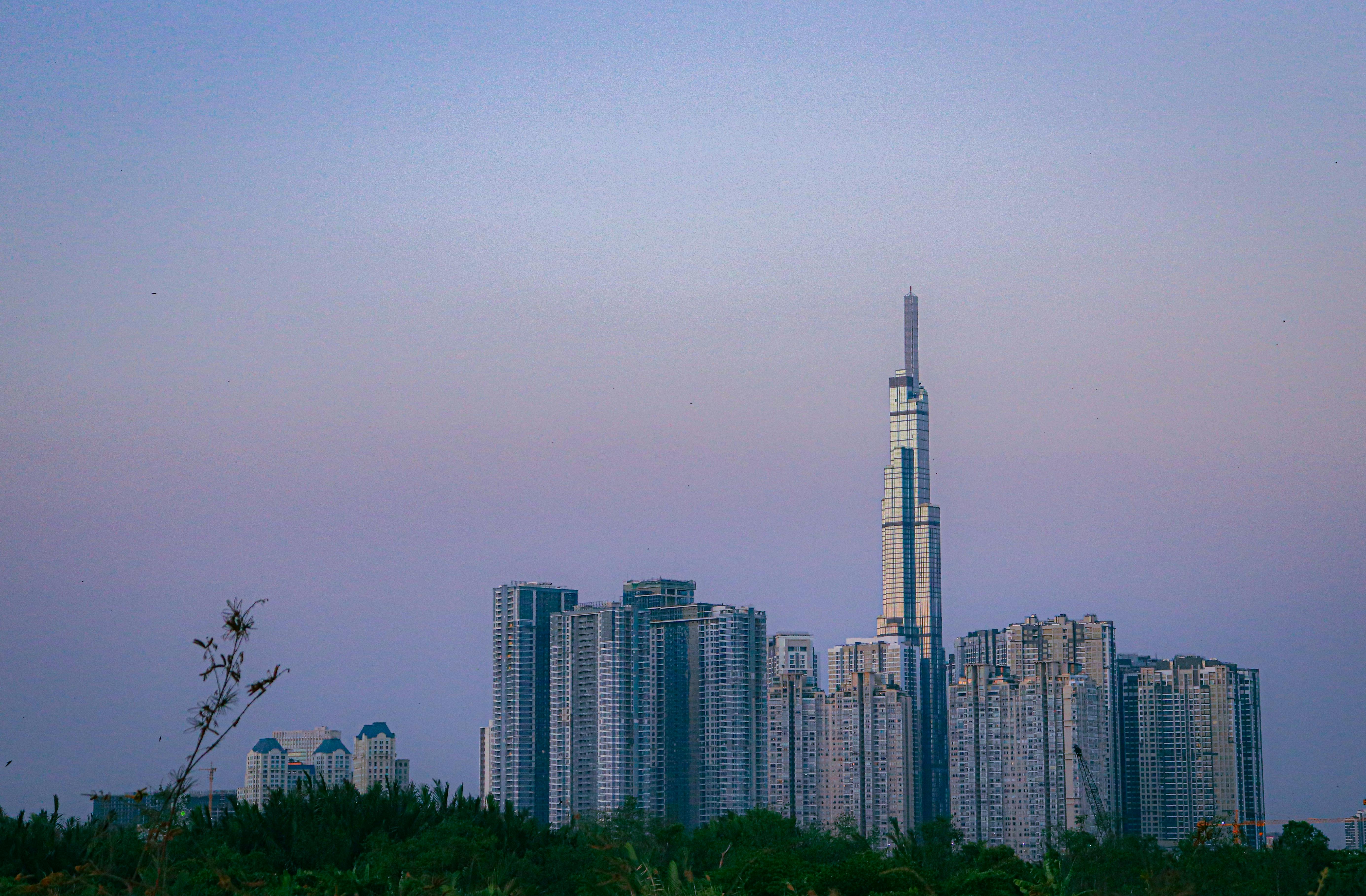 Saigon River and Landmark 81 Skyline · Free Stock Photo