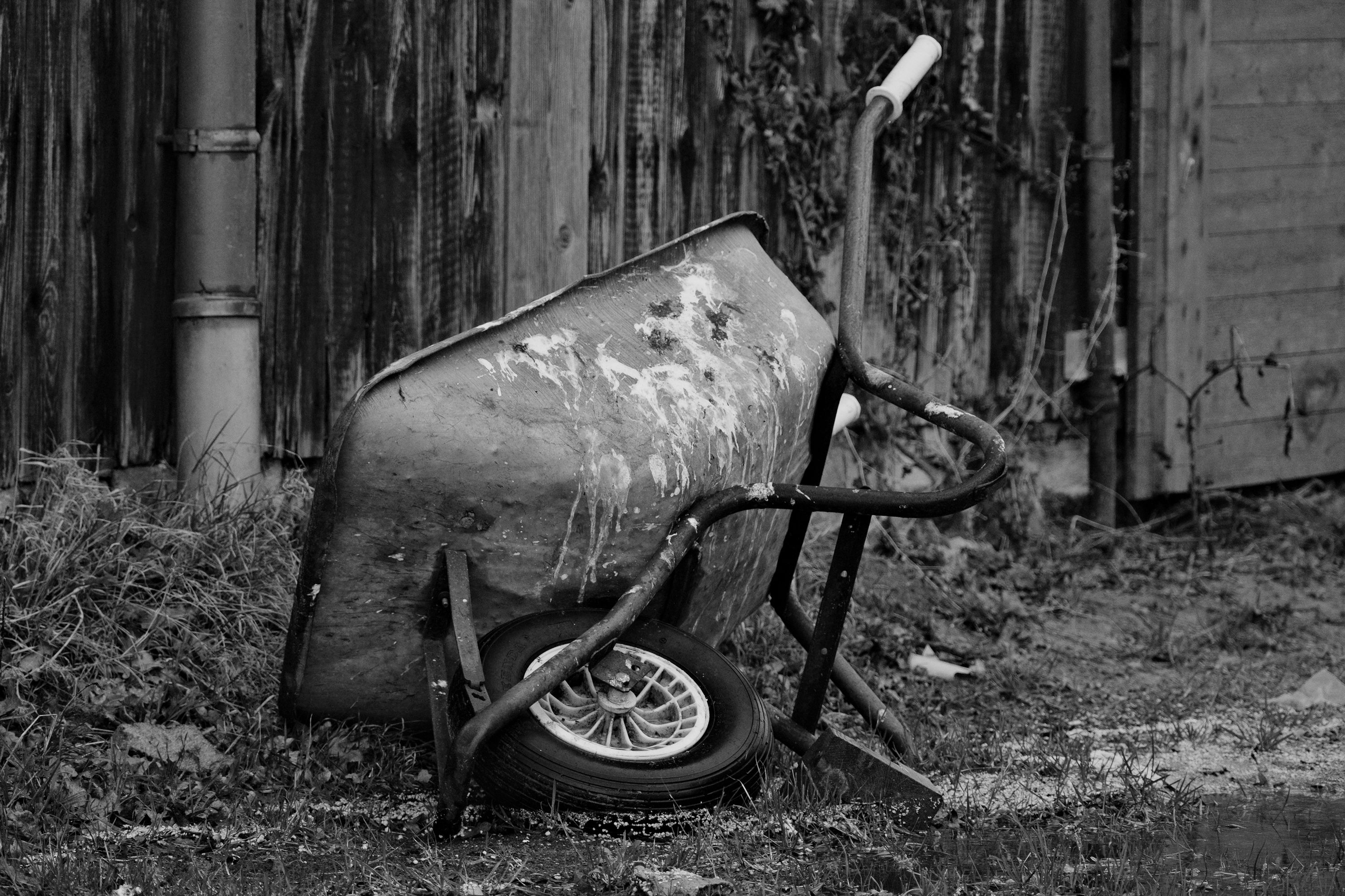 Abandoned Wheelbarrow on Ground · Free Stock Photo