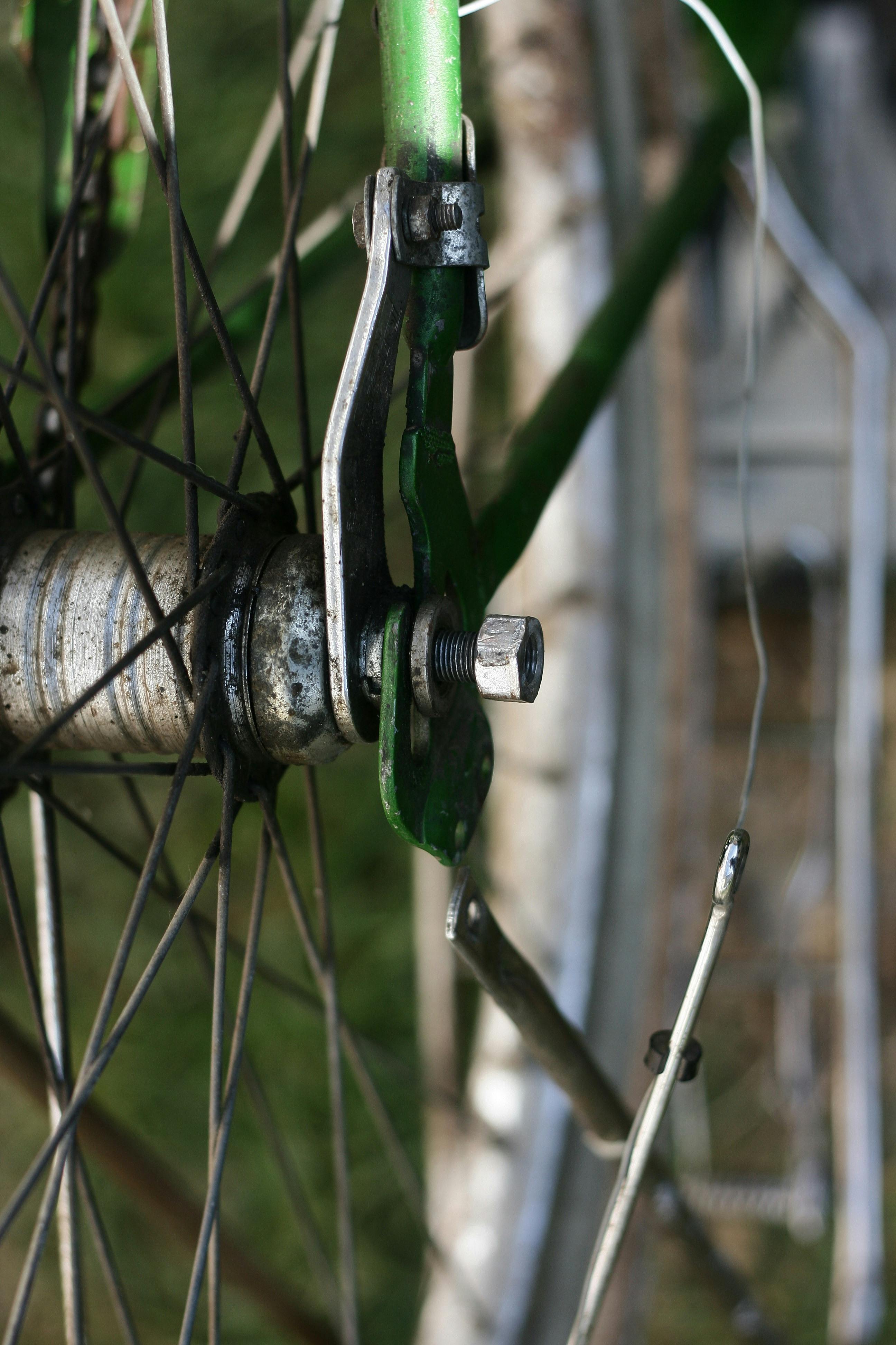 Fork, Screw and Rims of Bicycle Wheel · Free Stock Photo